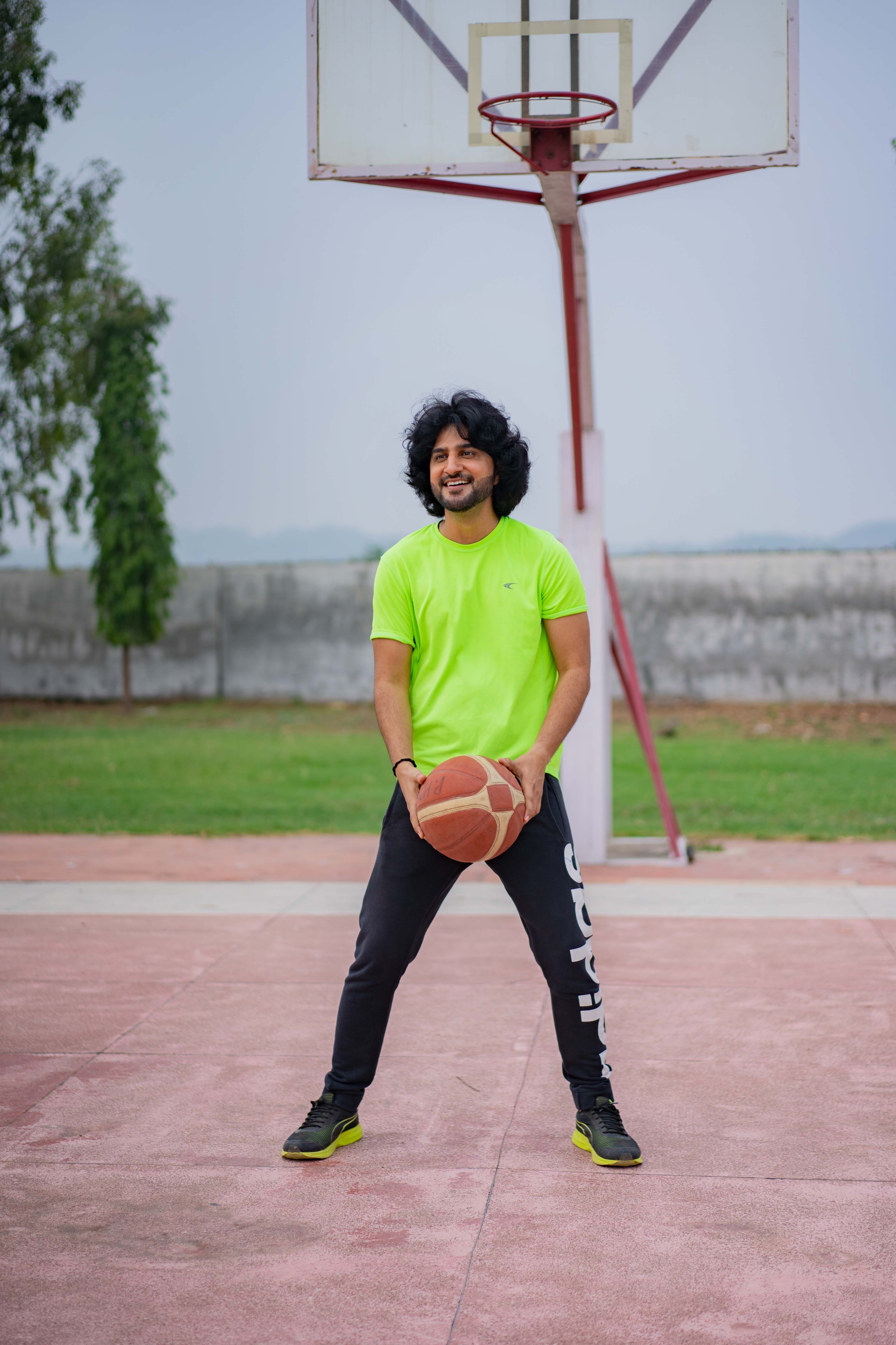 Person Holding Basketball · Free Stock Photo