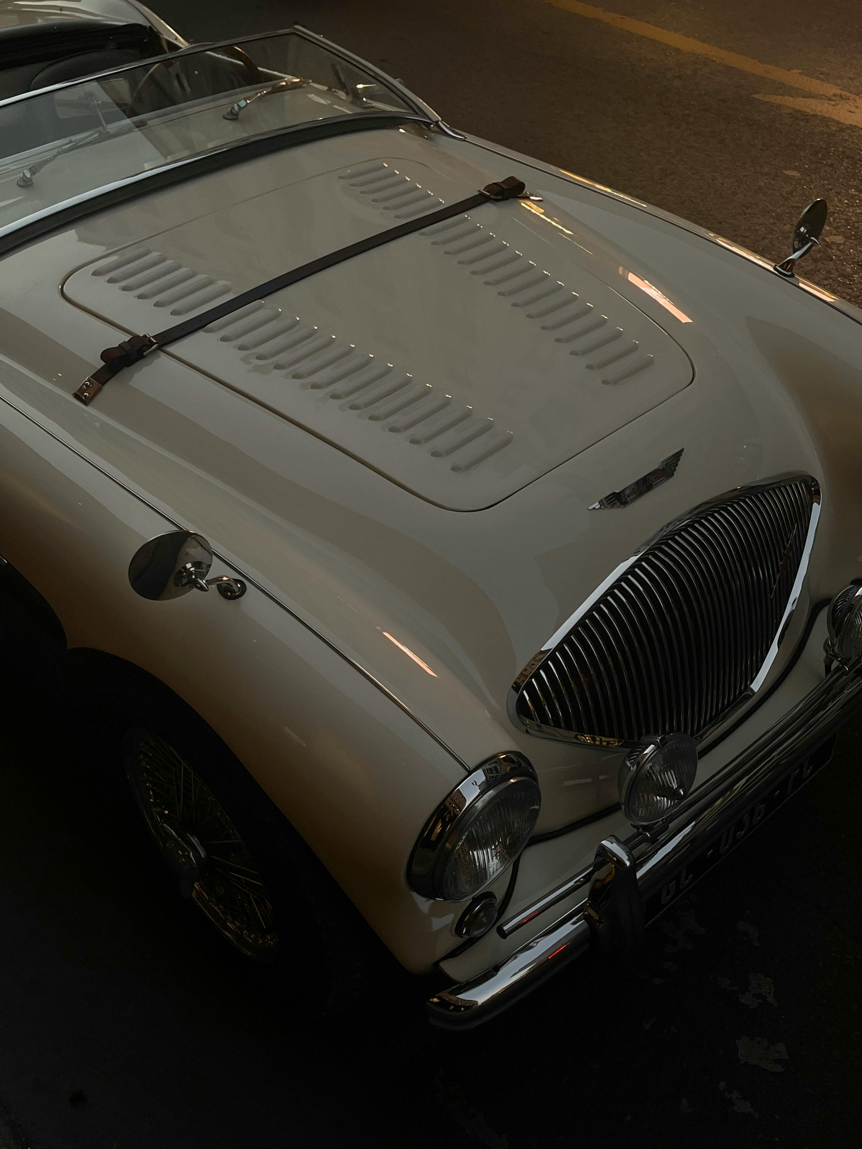 Close-Up Shot of a White Vintage Car · Free Stock Photo