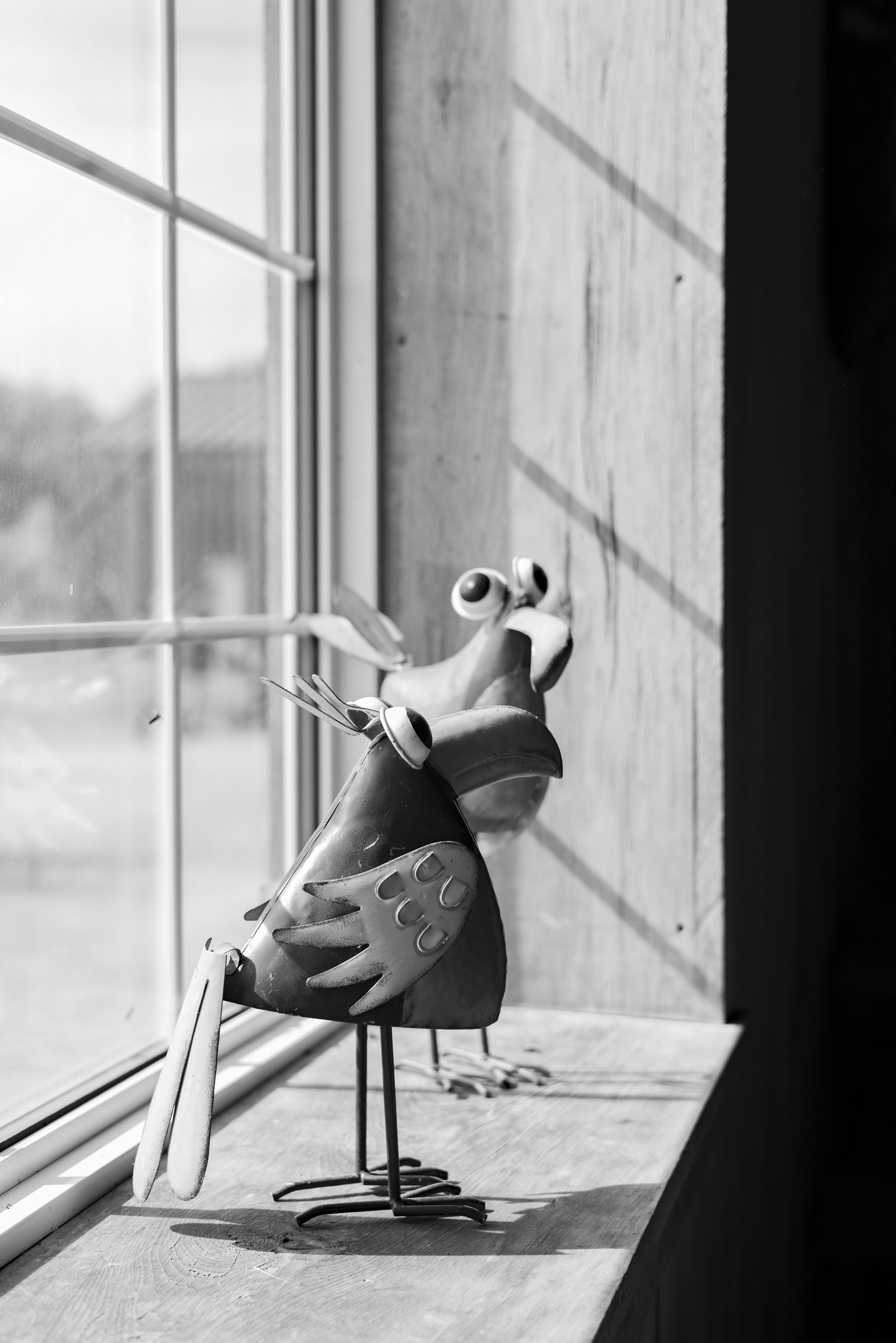 Figurines on Windowsill · Free Stock Photo