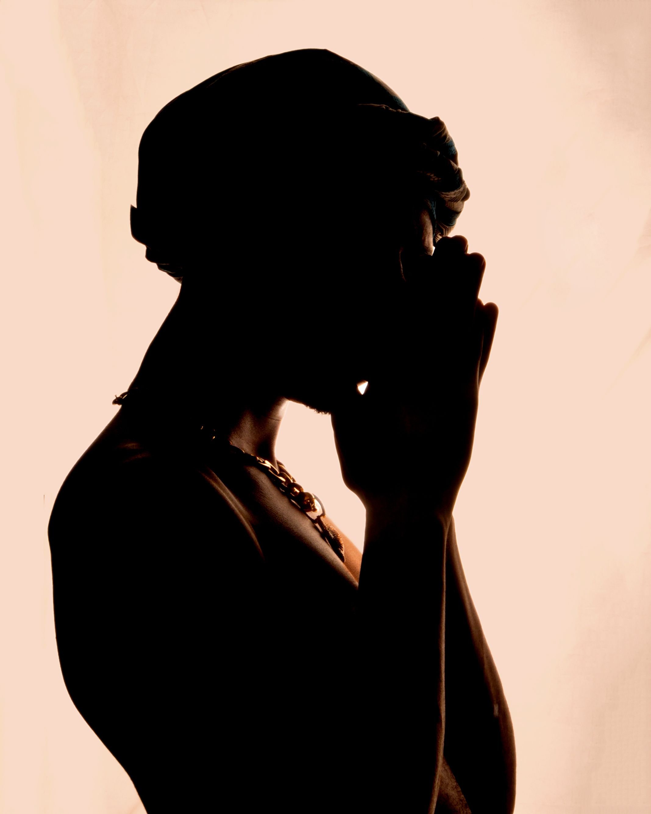 Woman Standing behind Bright Blue Light · Free Stock Photo
