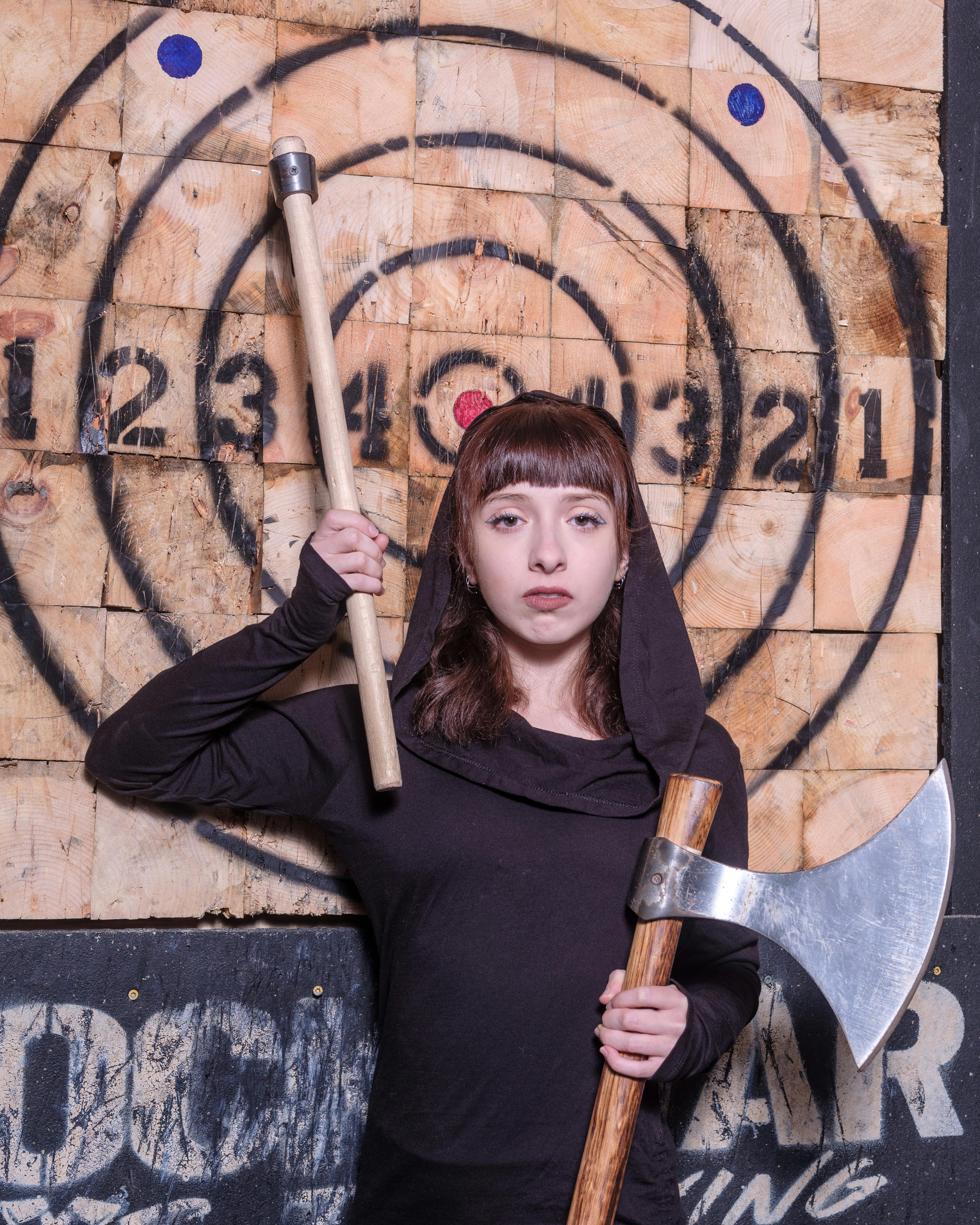 Woman Holding an Axe · Free Stock Photo