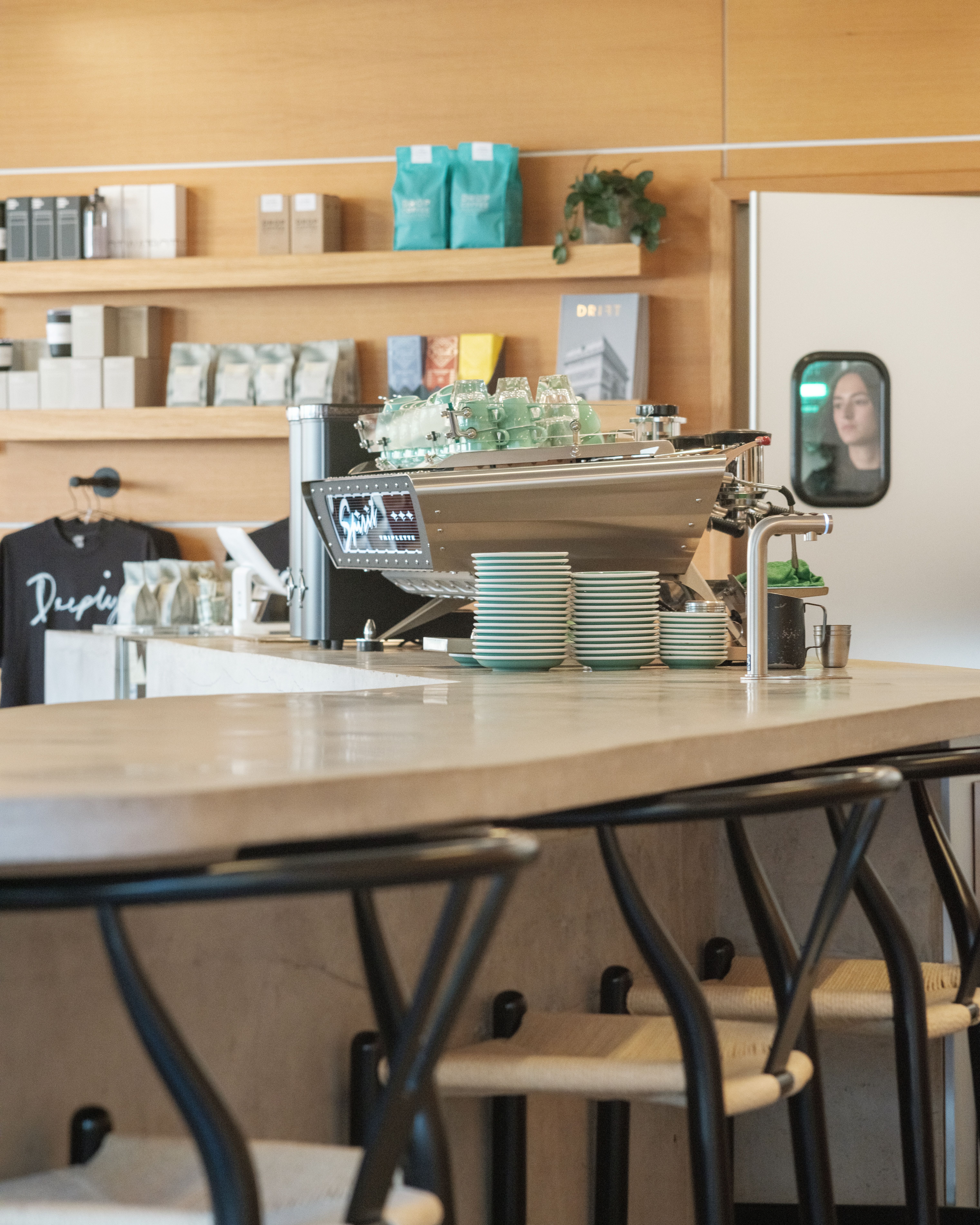 Cups and Saucers over a Counter Table · Free Stock Photo