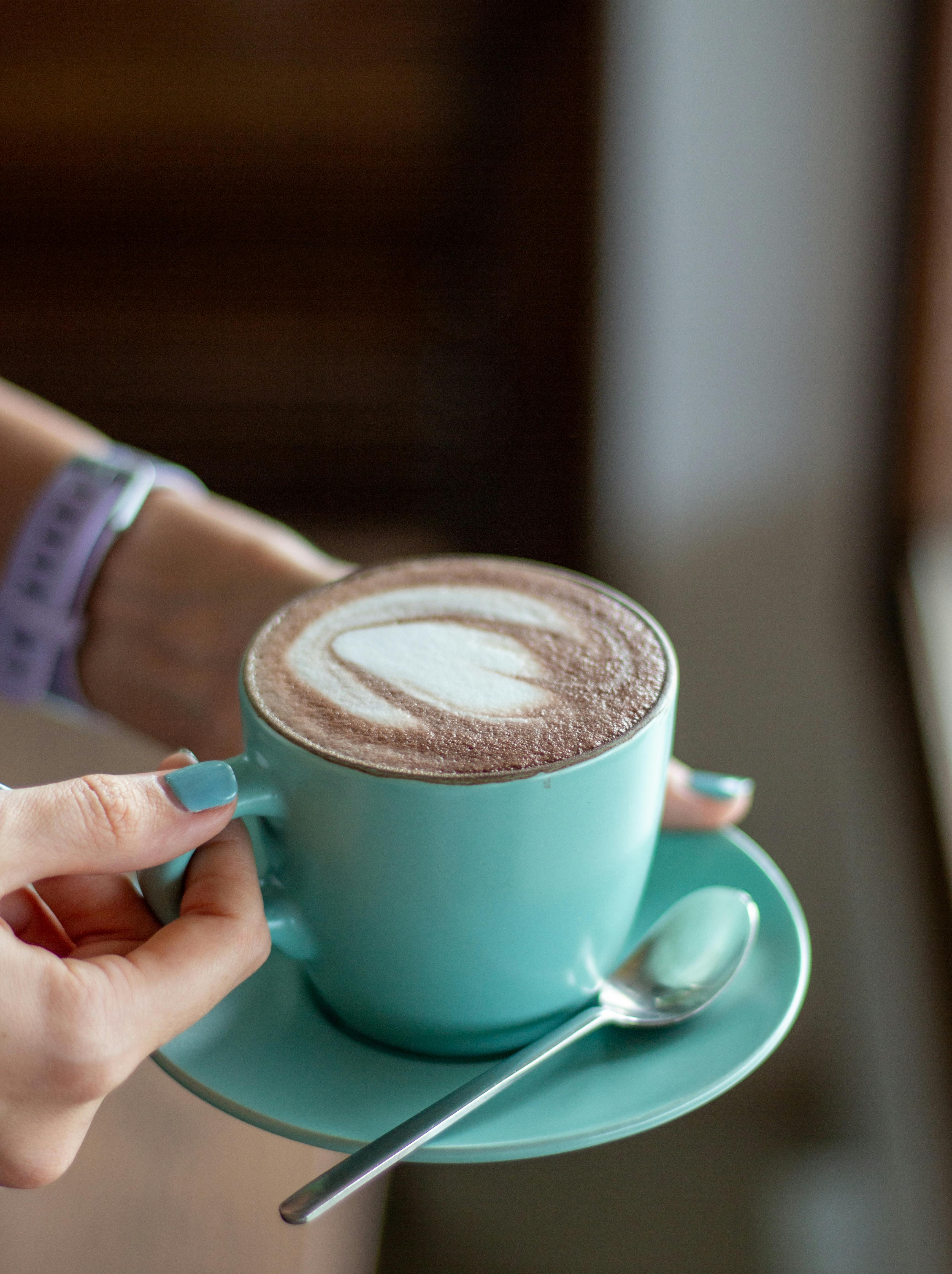 Hands Holding Cup of · Free Stock Photo