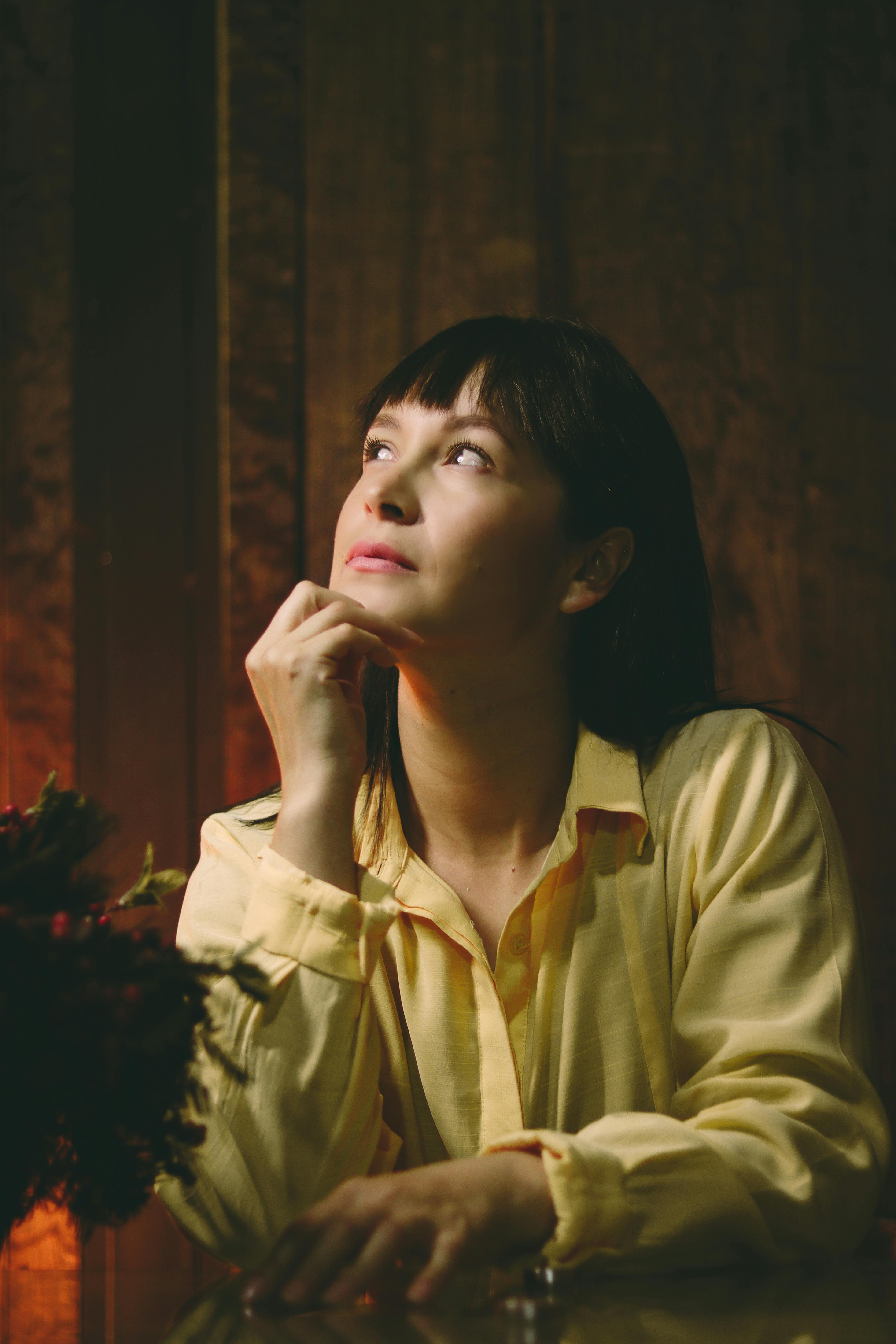 Portrait of Woman Deep in Thought · Free Stock Photo