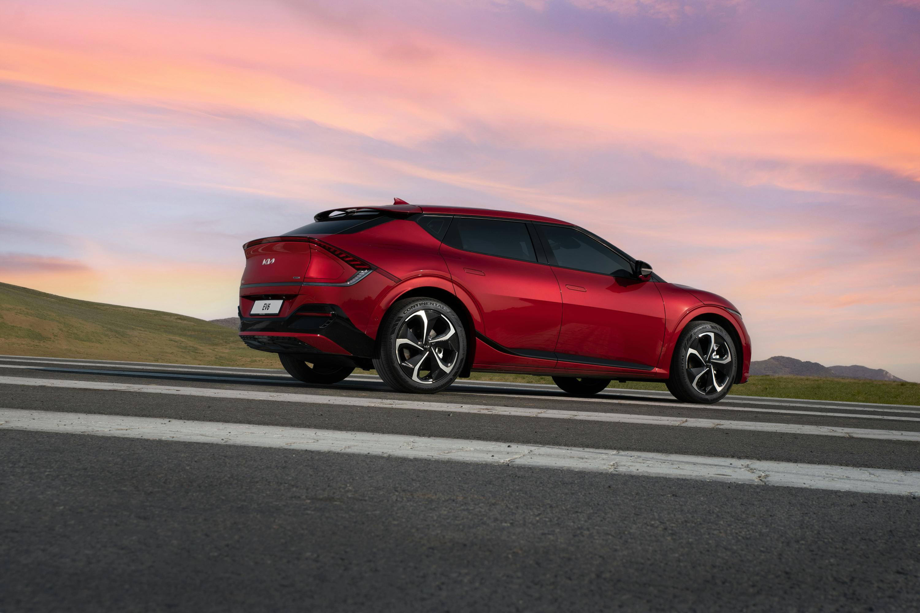 Red Kia EV6 in Town · Free Stock Photo