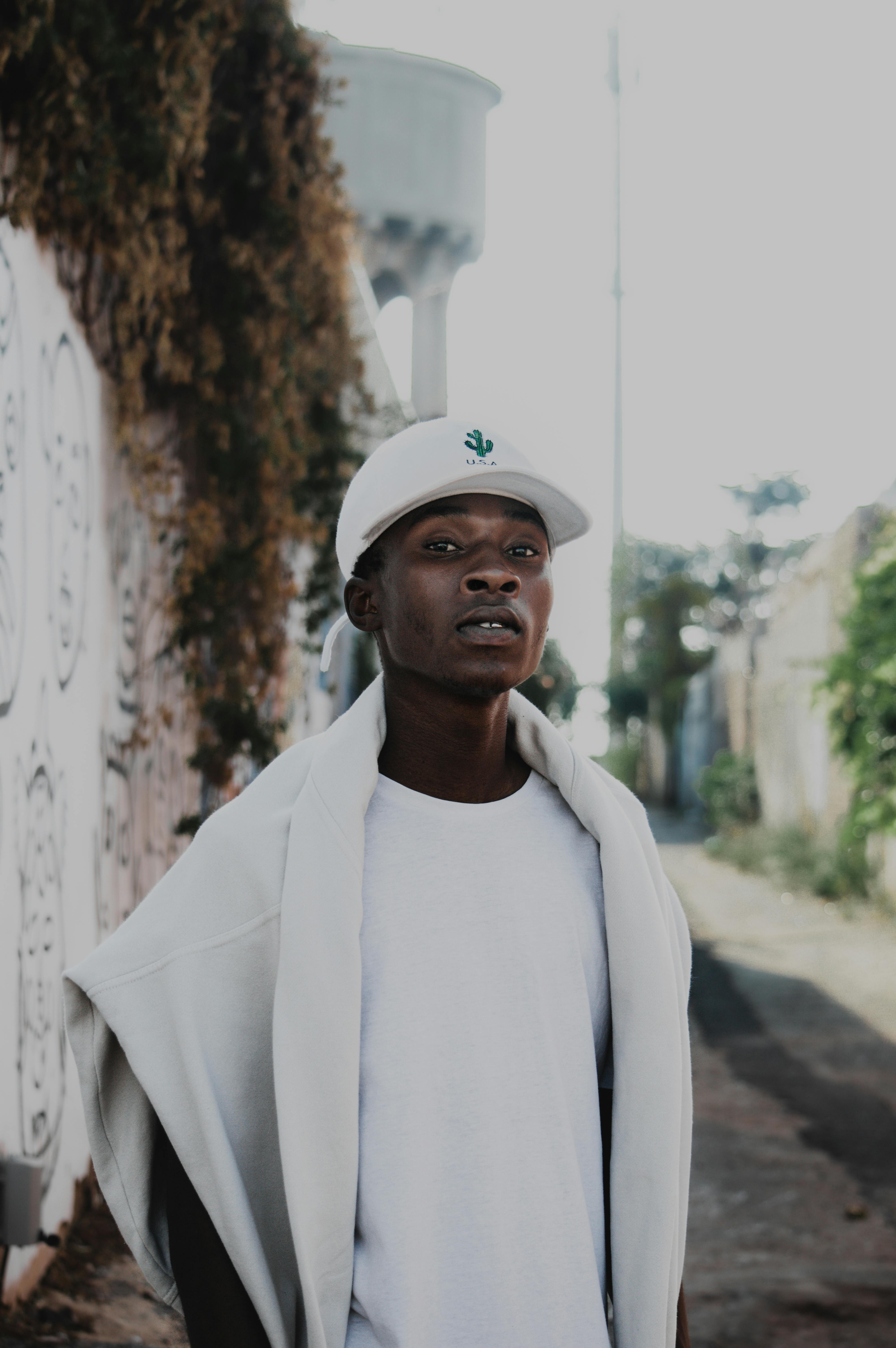 Photo of Man Wearing White Cap · Free Stock Photo