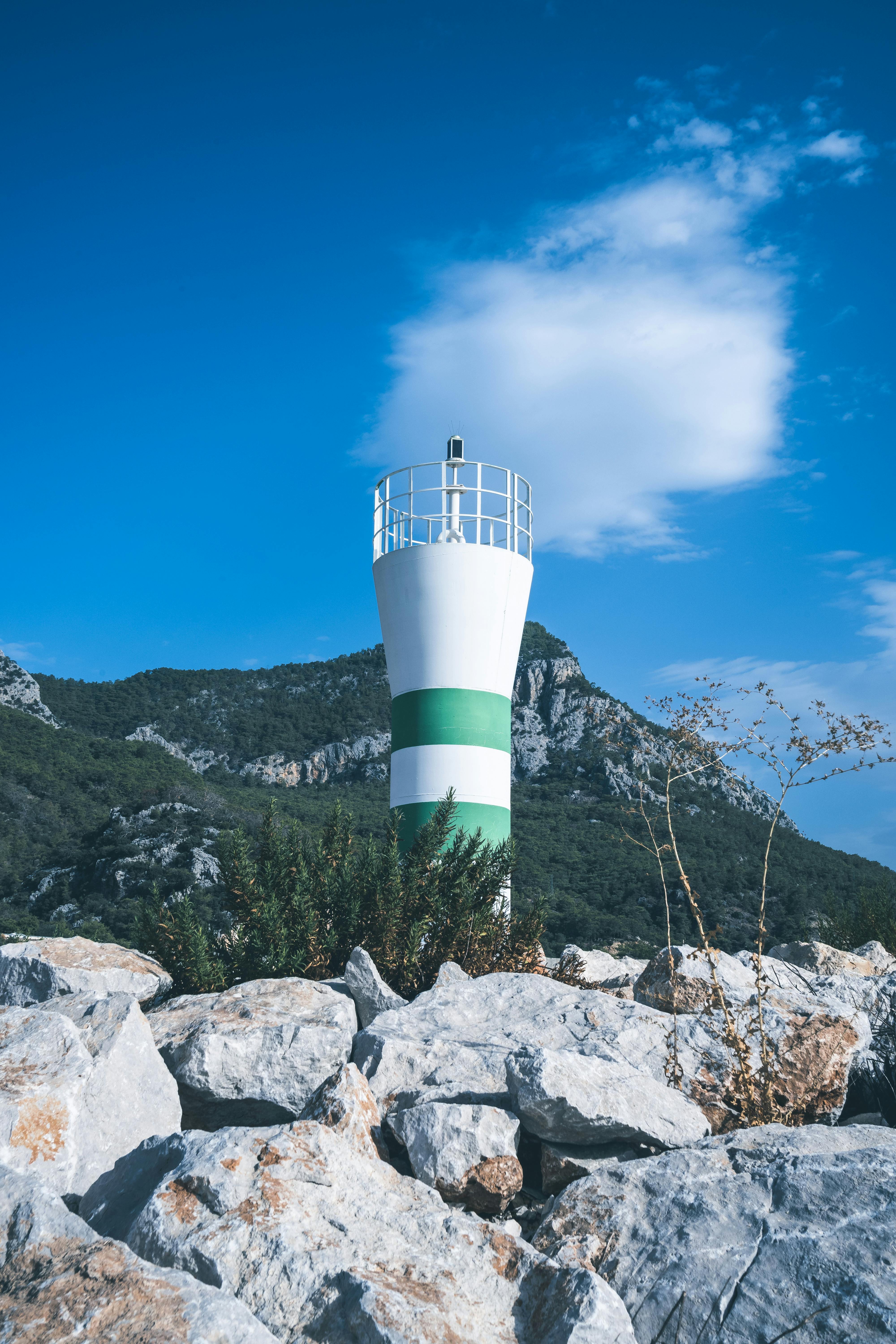 Lighthouse on Rocks · Free Stock Photo