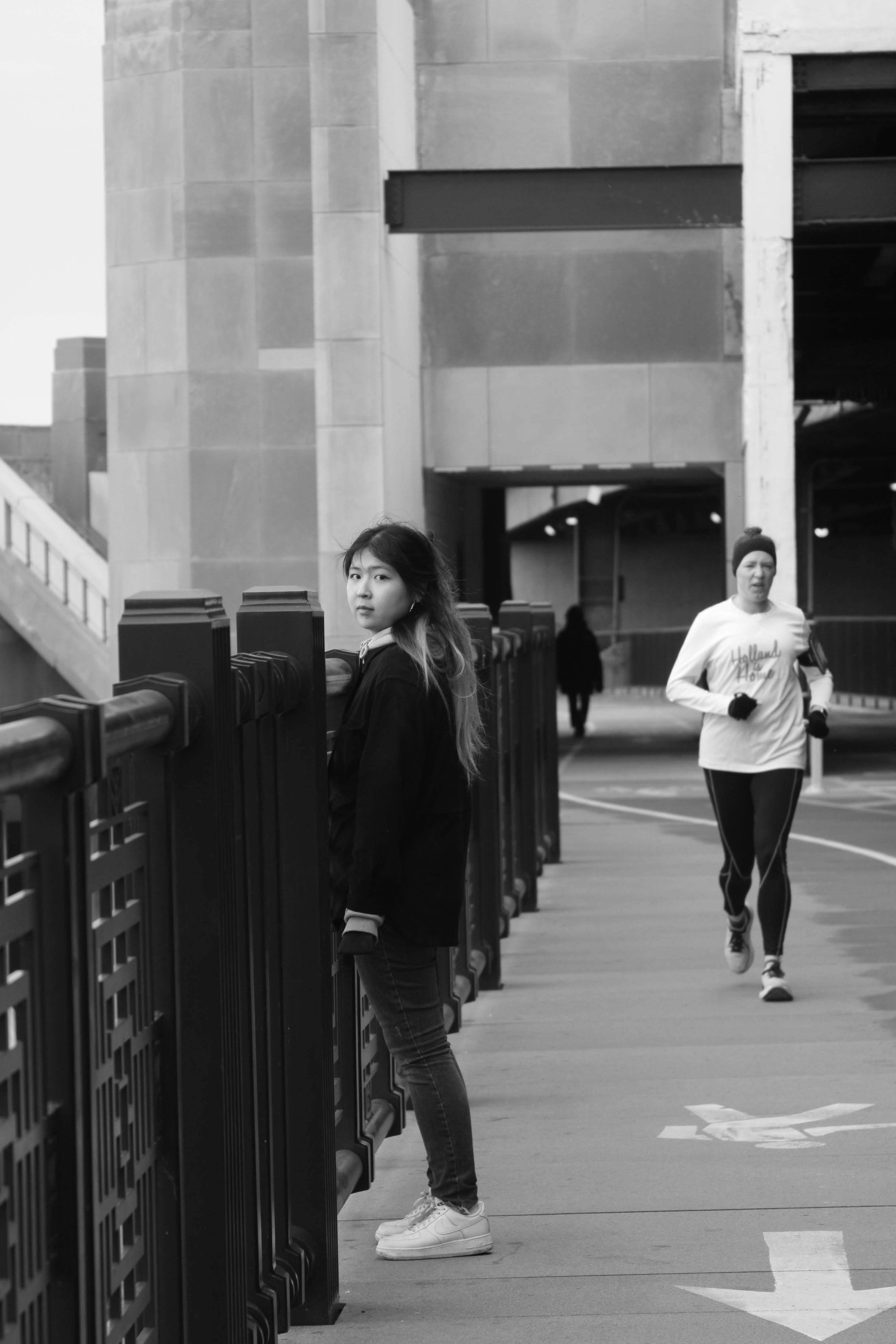 Grayscale Photography of a Woman Standing Beside the Guard Rail · Free ...