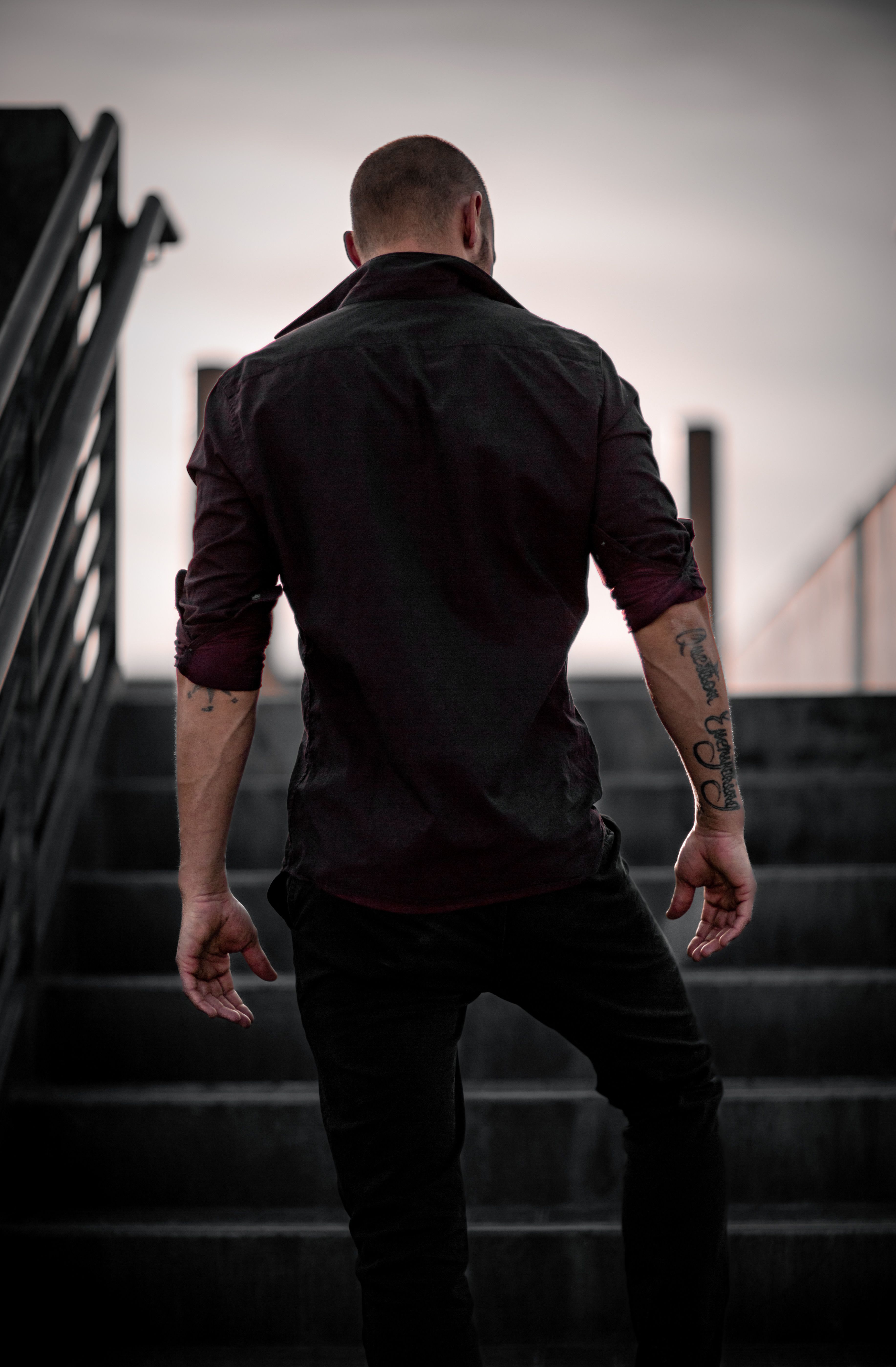 Person in Black Long Sleeves Arm Resting on Arm Rest · Free Stock Photo