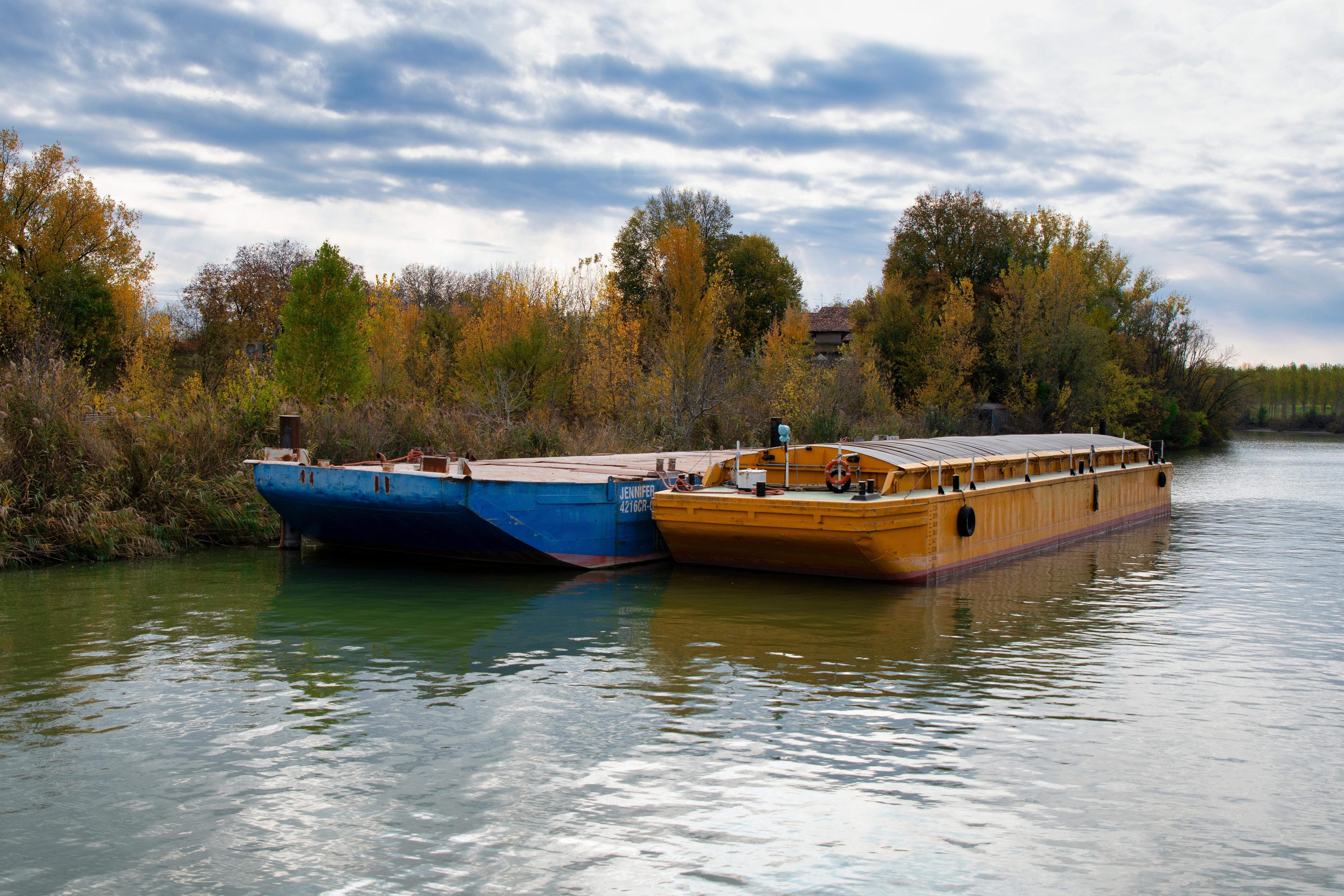 Barges Docked on Riverside · Free Stock Photo