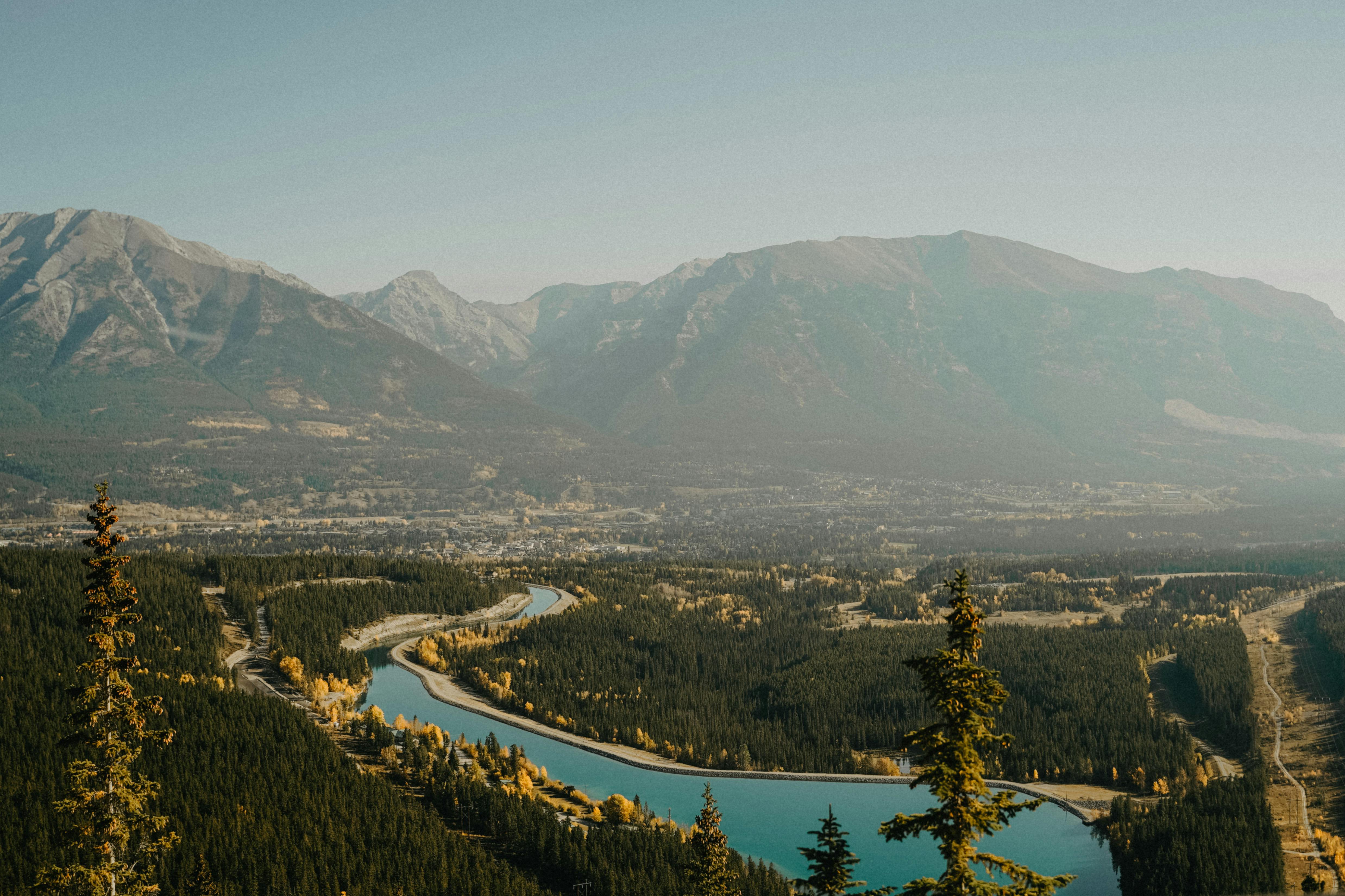 Aerial Photography of River Near Mountains · Free Stock Photo