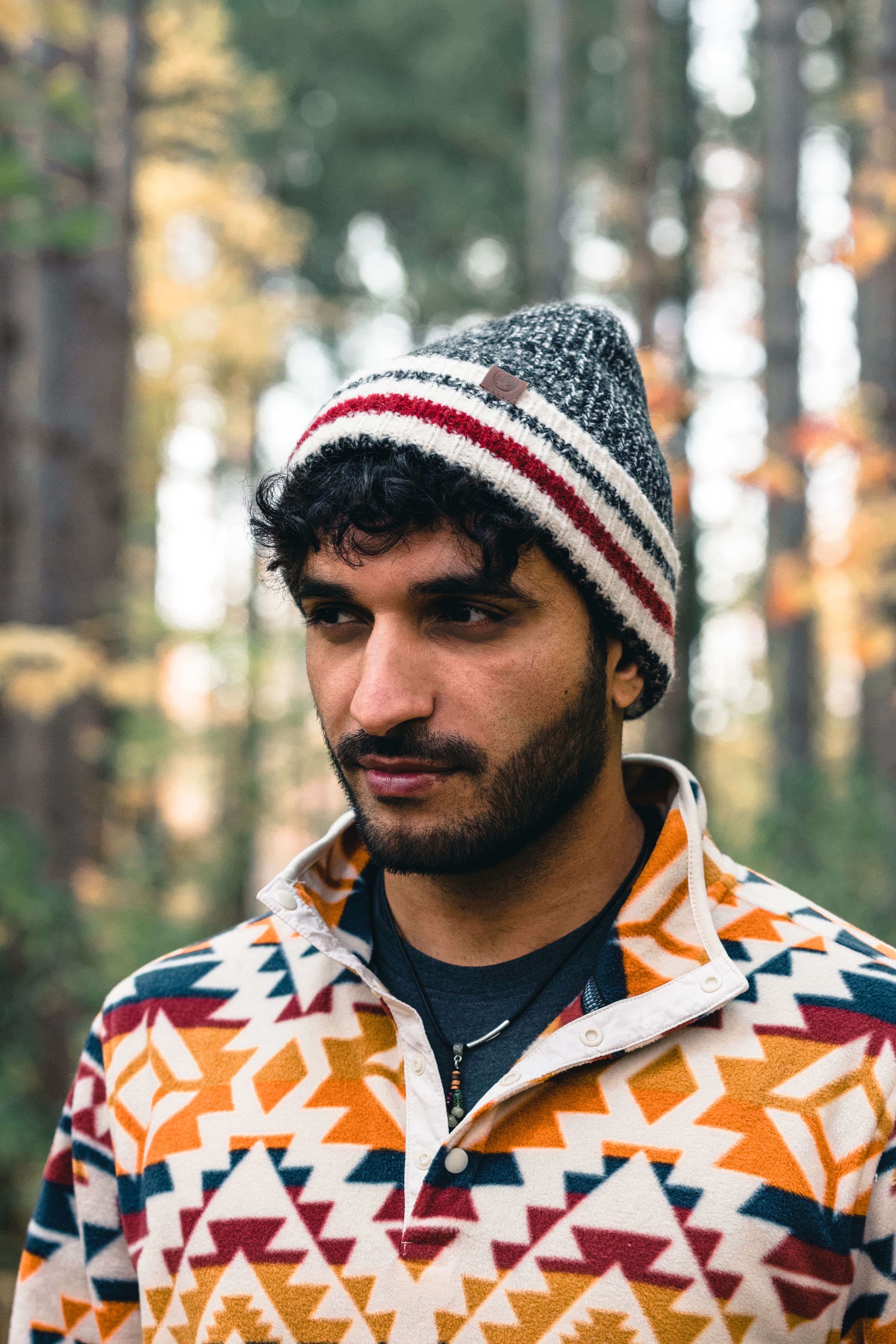 Smiling Man Wearing Black Beanie Hat · Free Stock Photo
