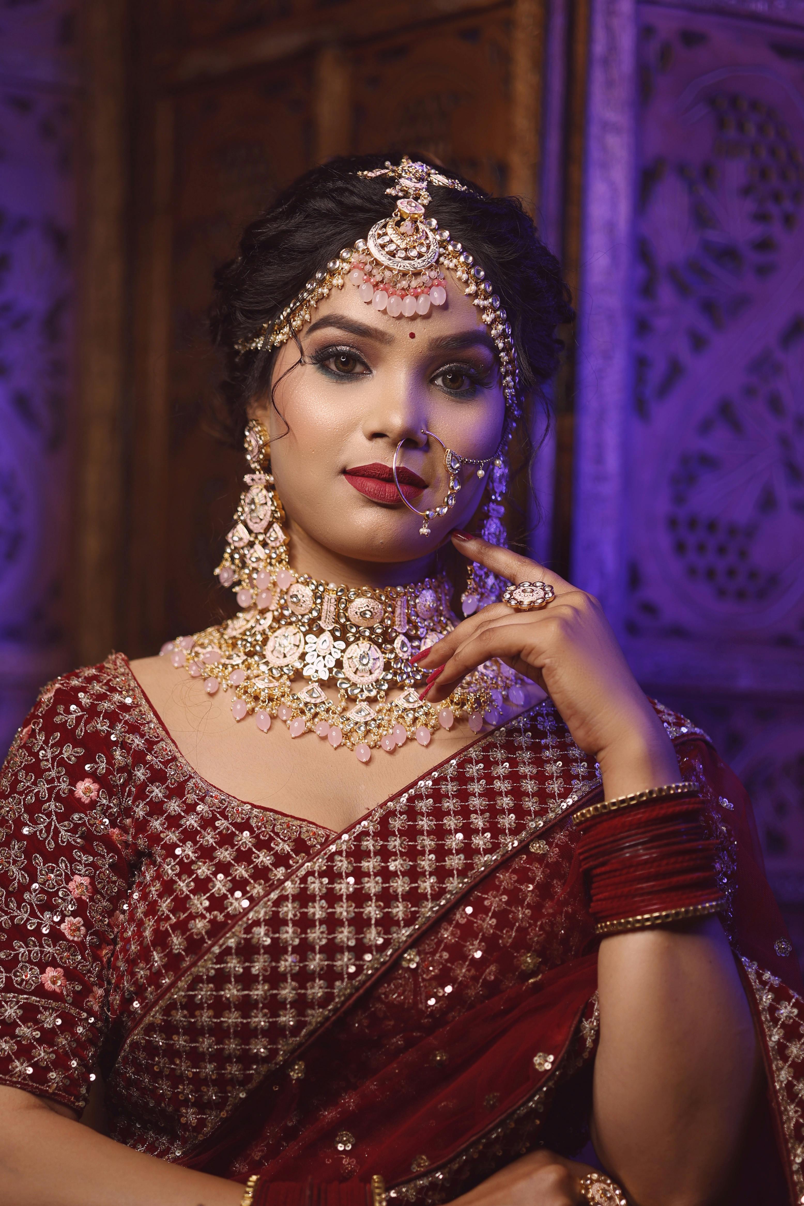 Close-Up Shot of a Beautiful Woman in Traditional Clothing · Free Stock Photo