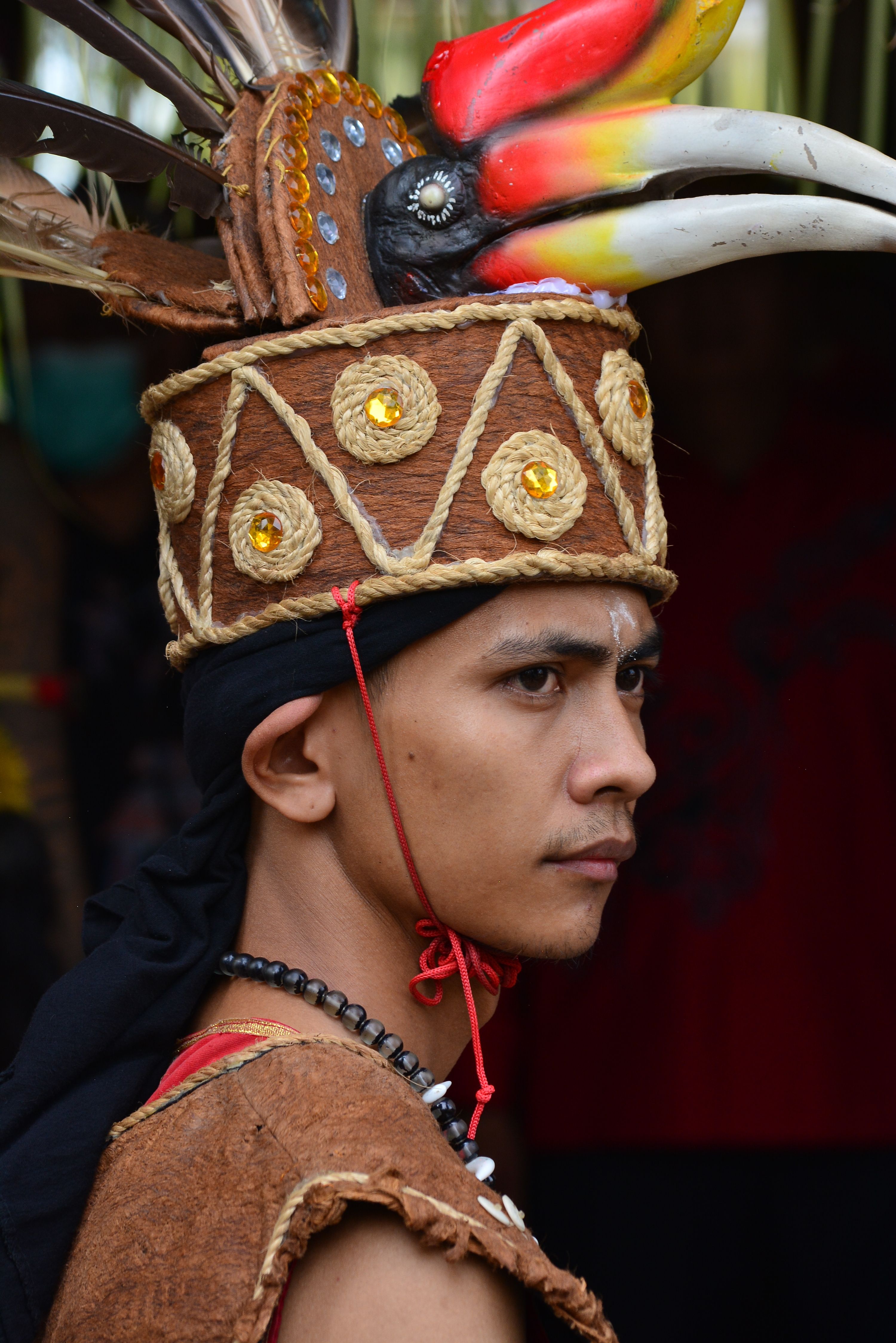 A Man in Traditional Headdress Looking afar · Free Stock Photo