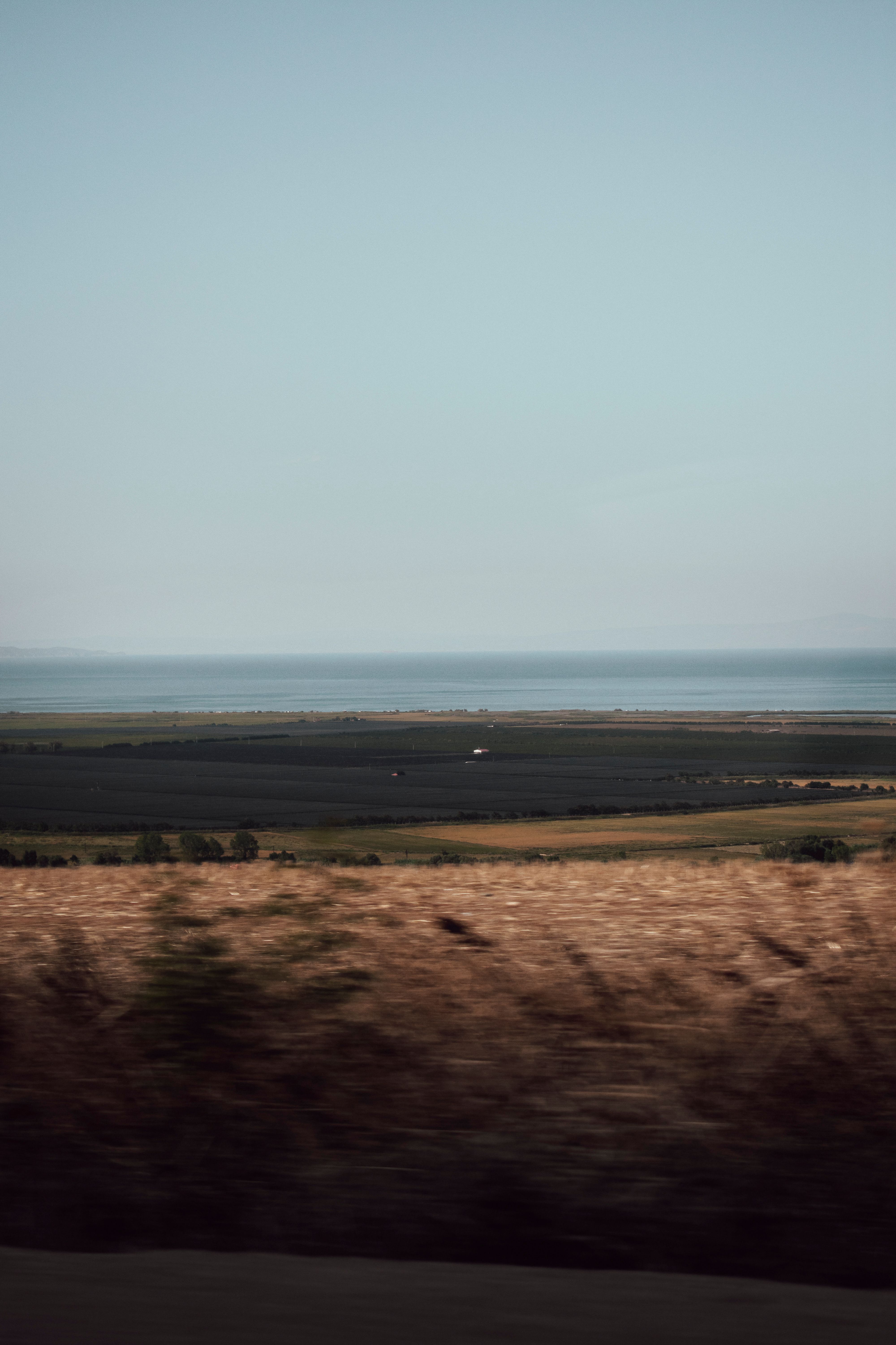 Clear Sky over Plains on Coast · Free Stock Photo