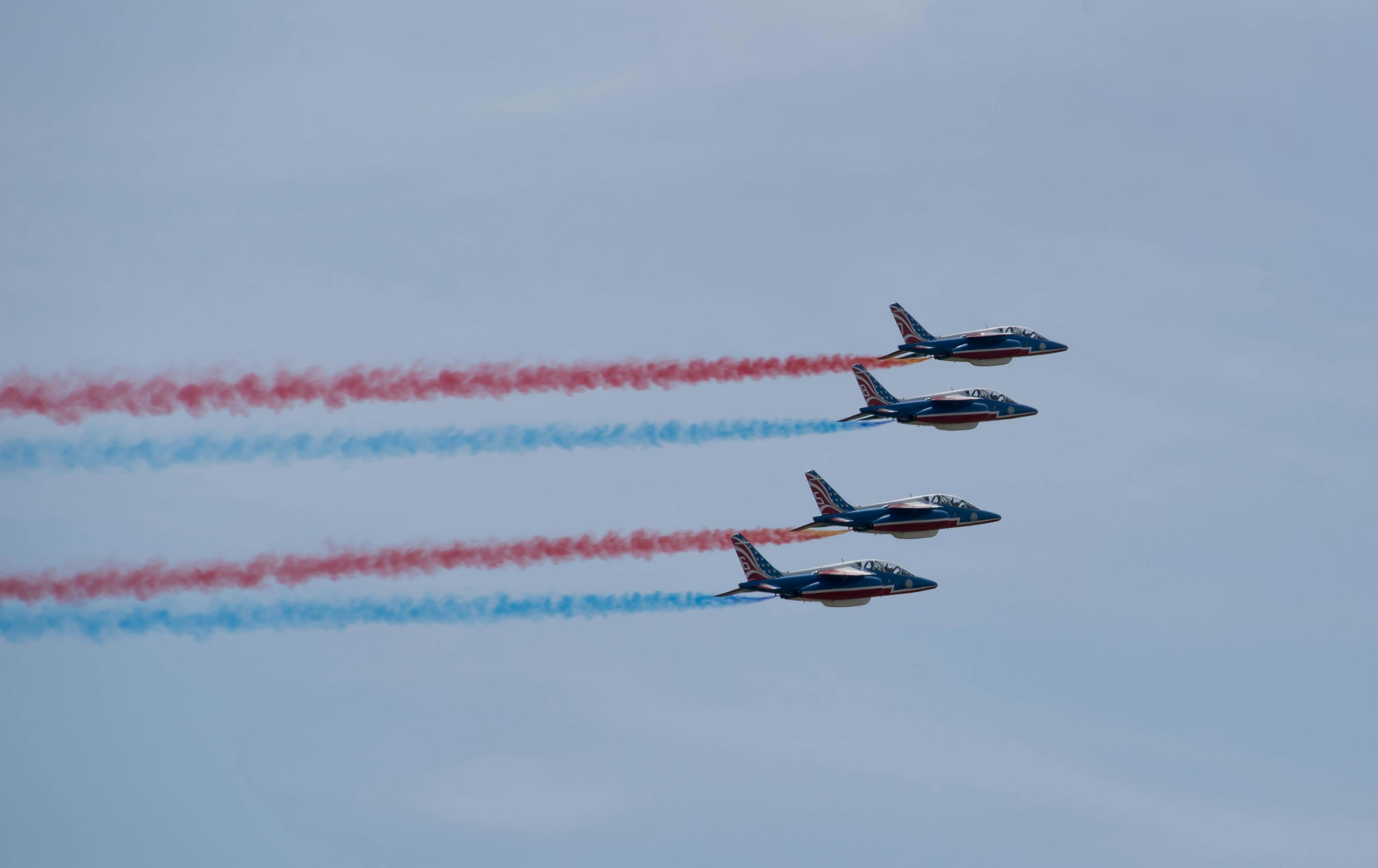 Red Jet Fighter Planes With Assorted Colors of Smoke on Horizon · Free ...