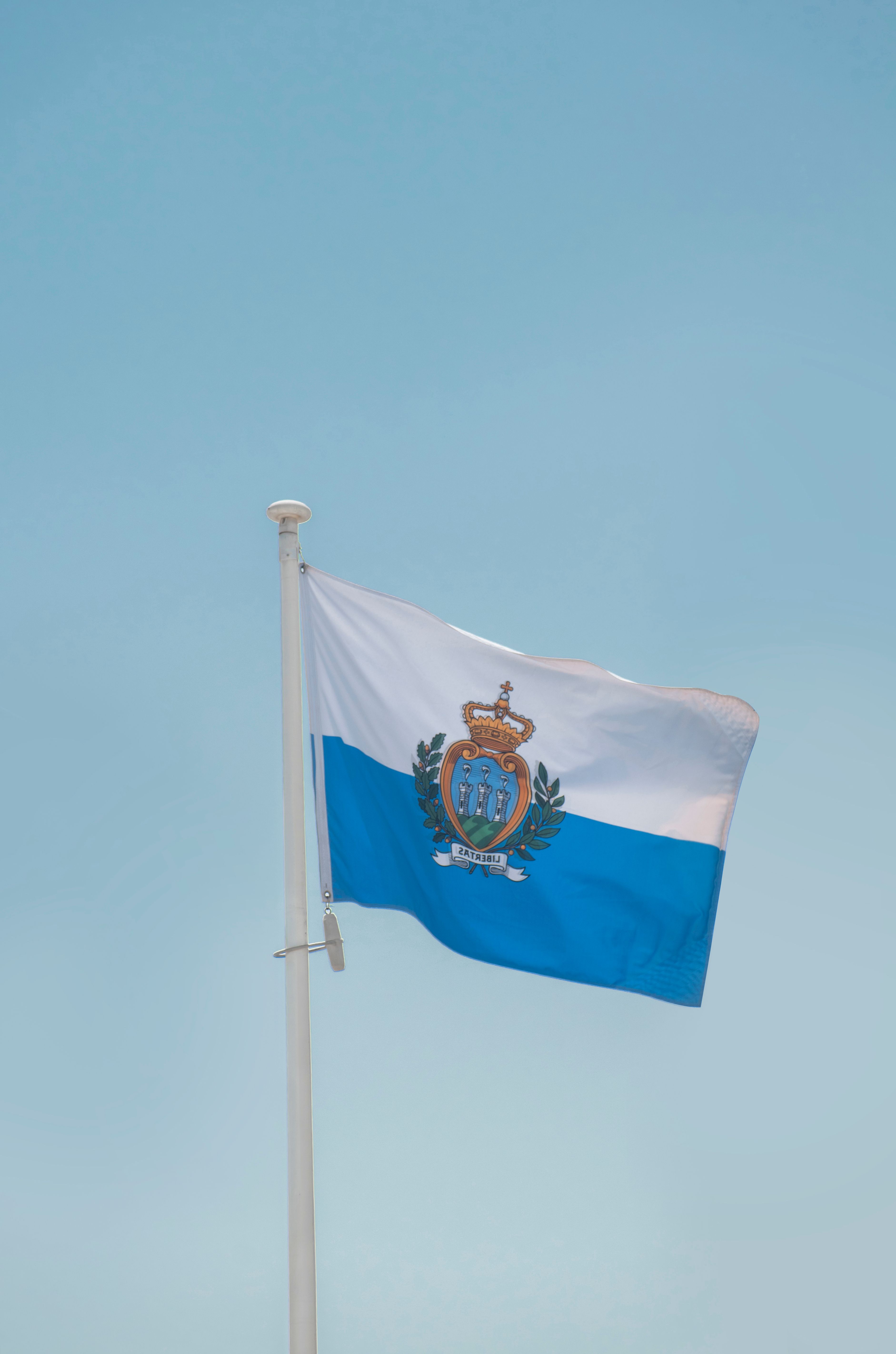 Low Angle Shot of Flags on the Background of a Clear Blue Sky · Free ...