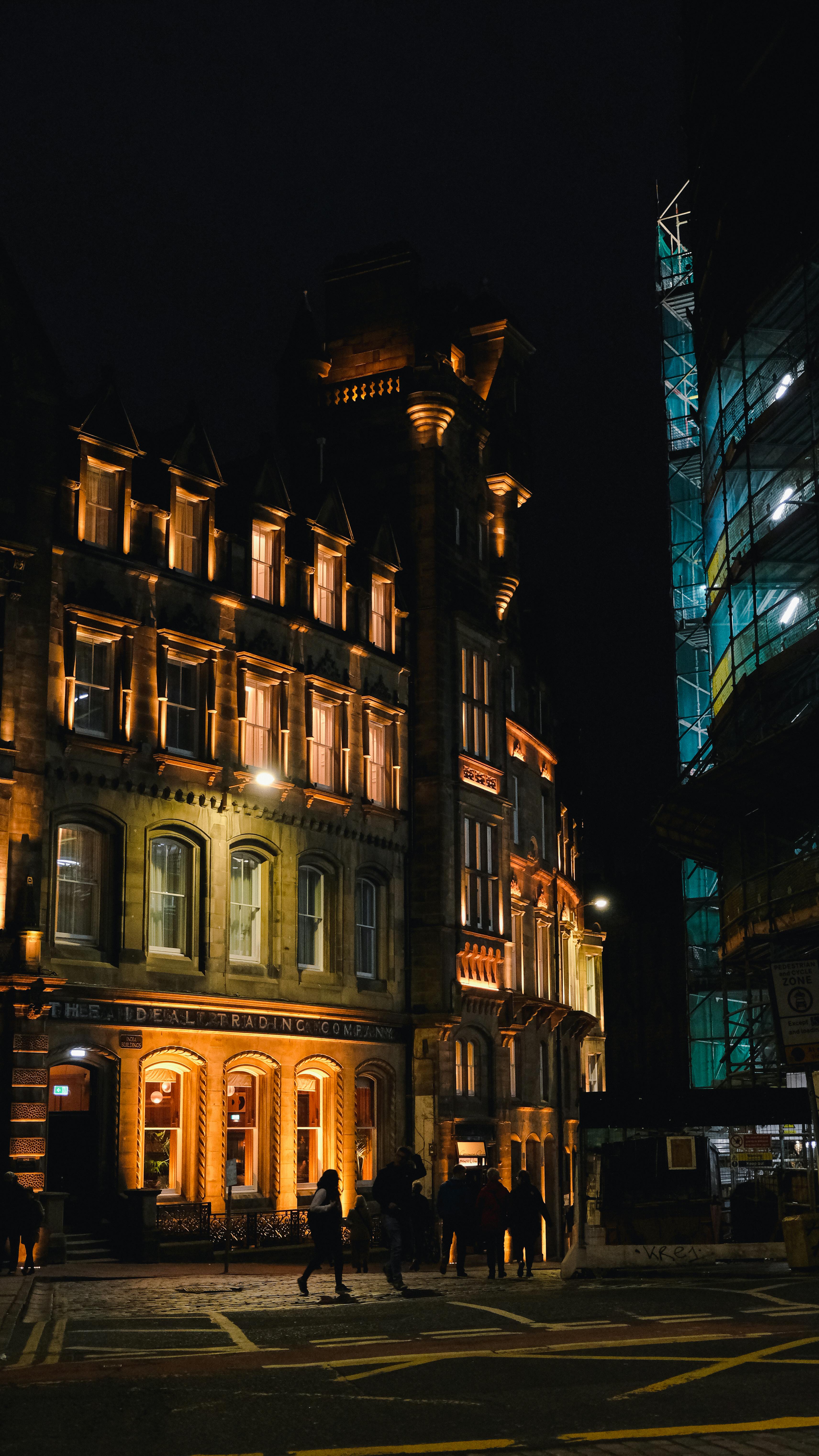 An Illuminated Building at Night · Free Stock Photo