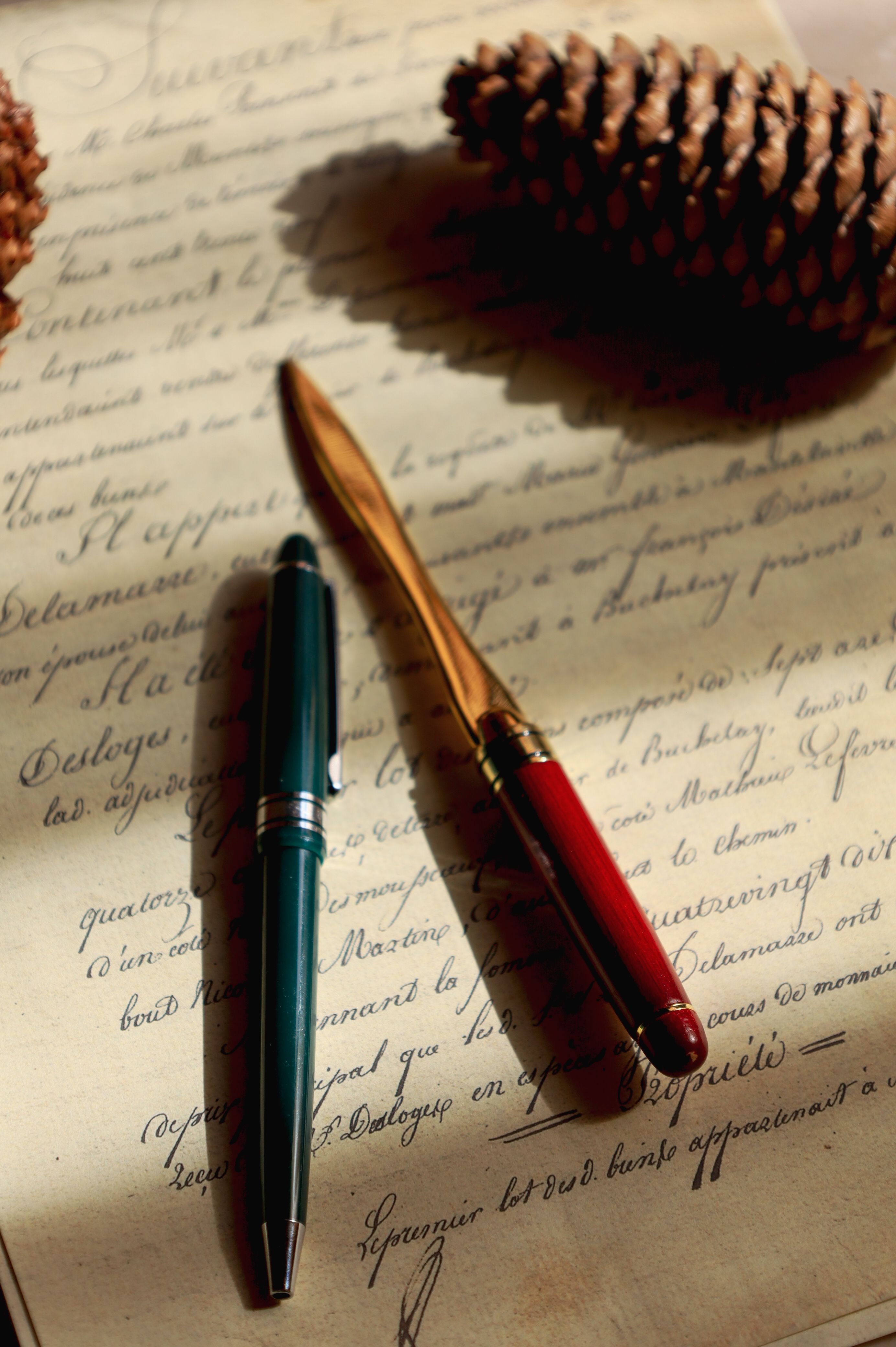 A Pen and a Letter Opener on a Letter · Free Stock Photo