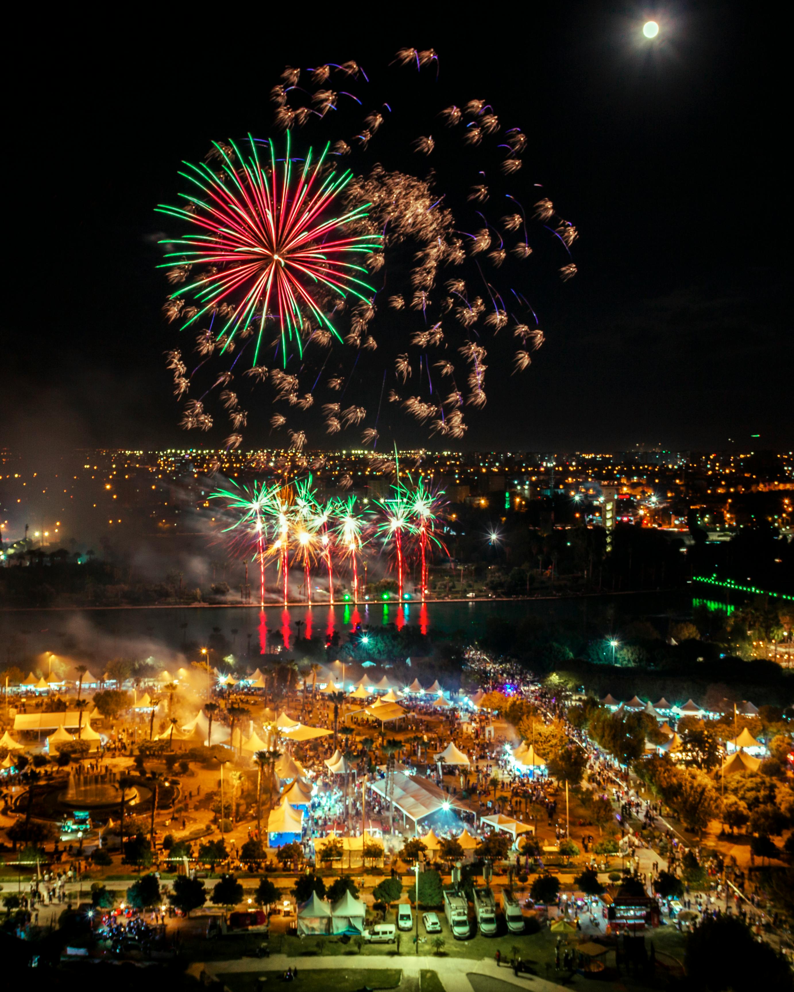 Firework Display Over a City · Free Stock Photo