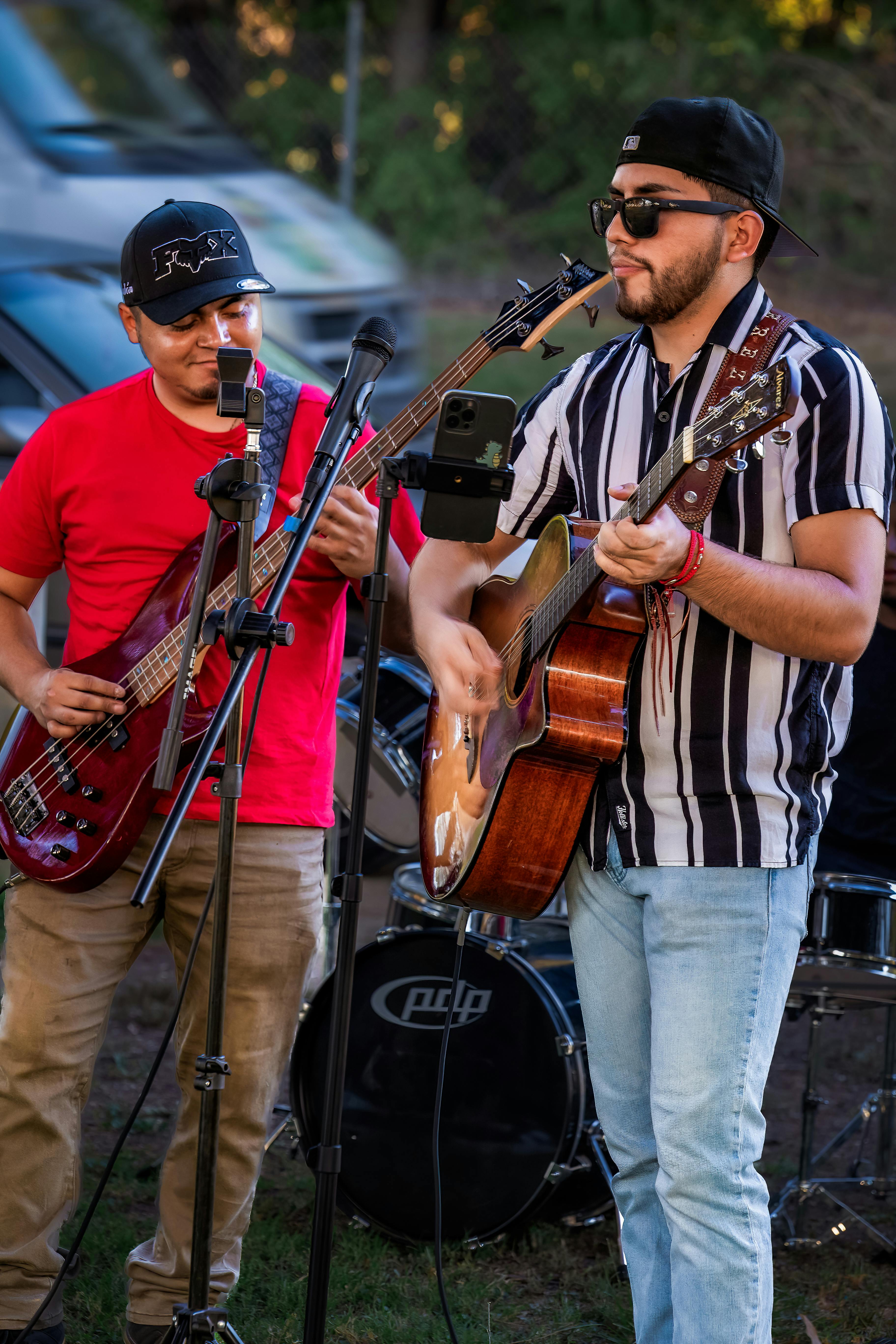Two Men Playing Guitars · Free Stock Photo