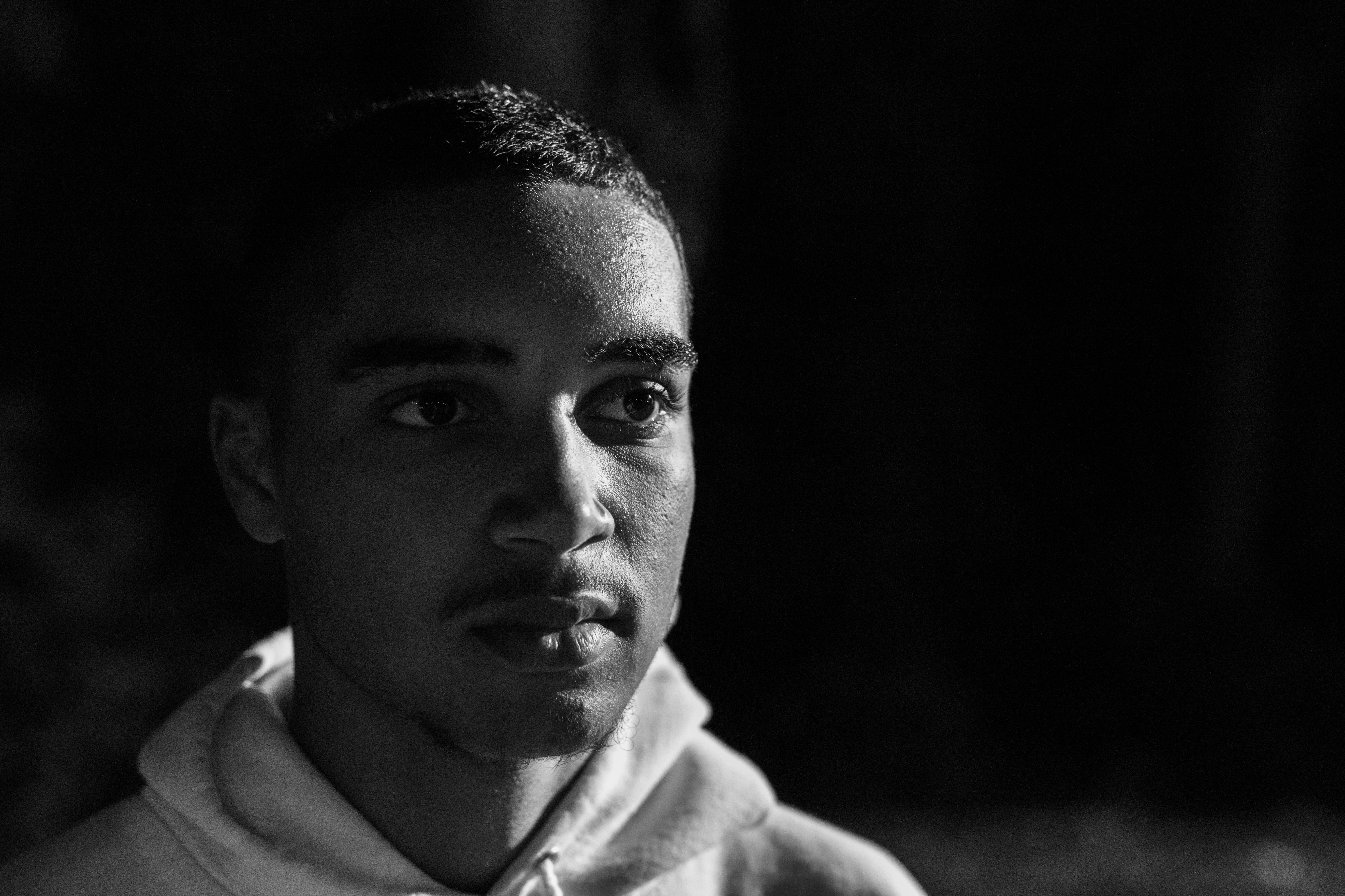 Grayscale Photo of a Man's Face · Free Stock Photo