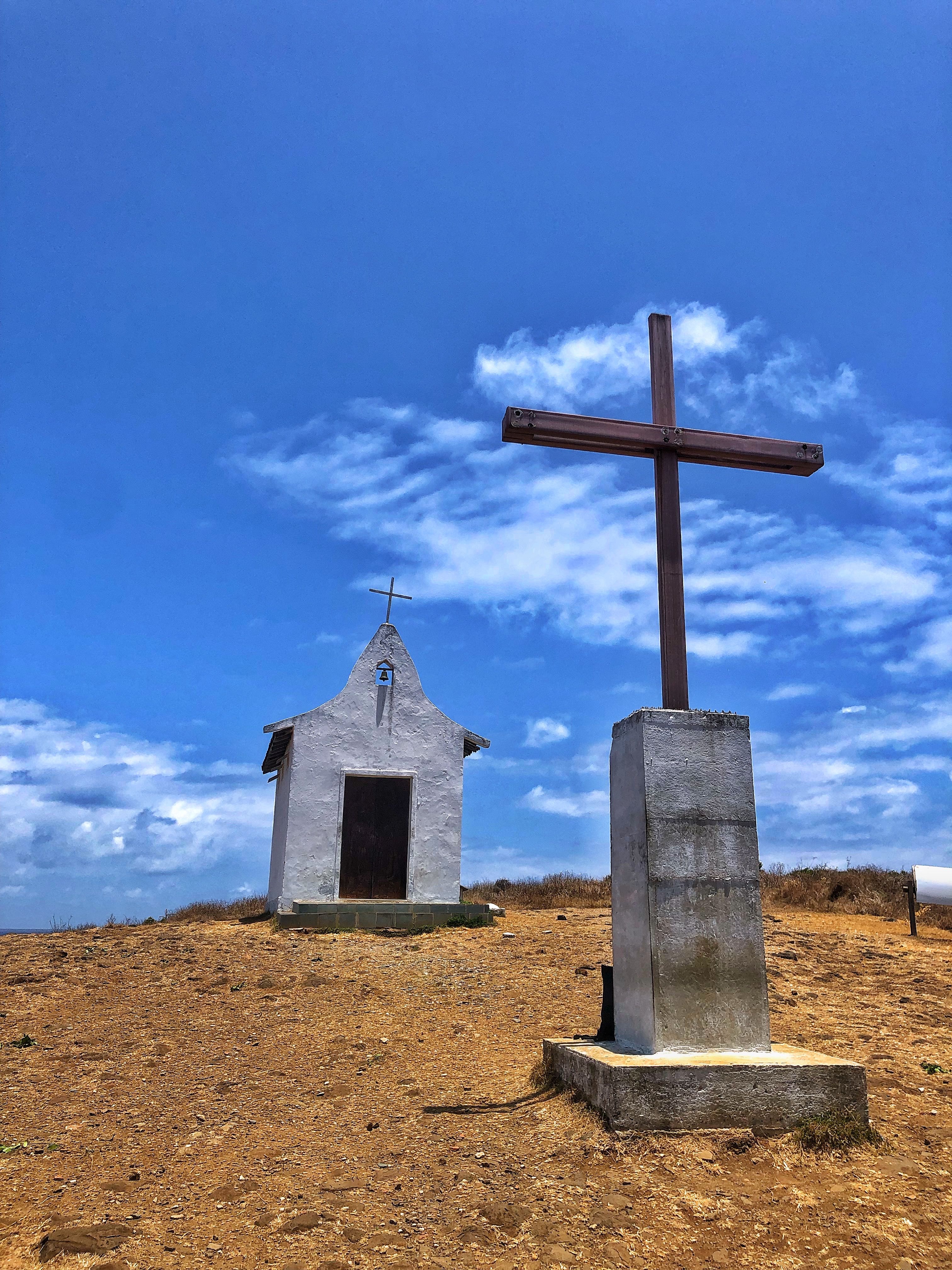 Low Angle Shot of Chapel and Cross Against Sky · Free Stock Photo
