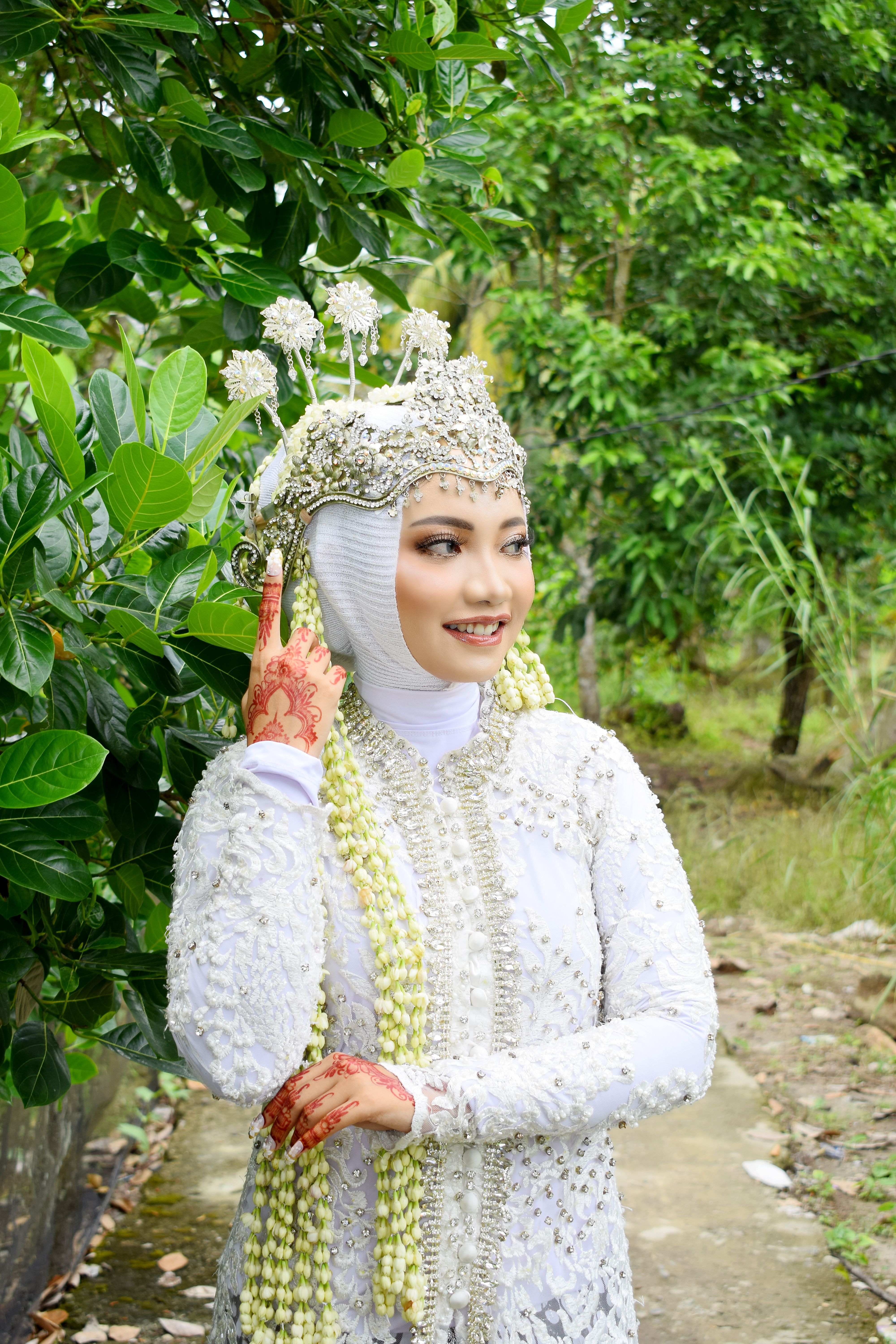 Hijabi Woman in Ornate Wedding Dress and Henna Tattoos · Free Stock Photo