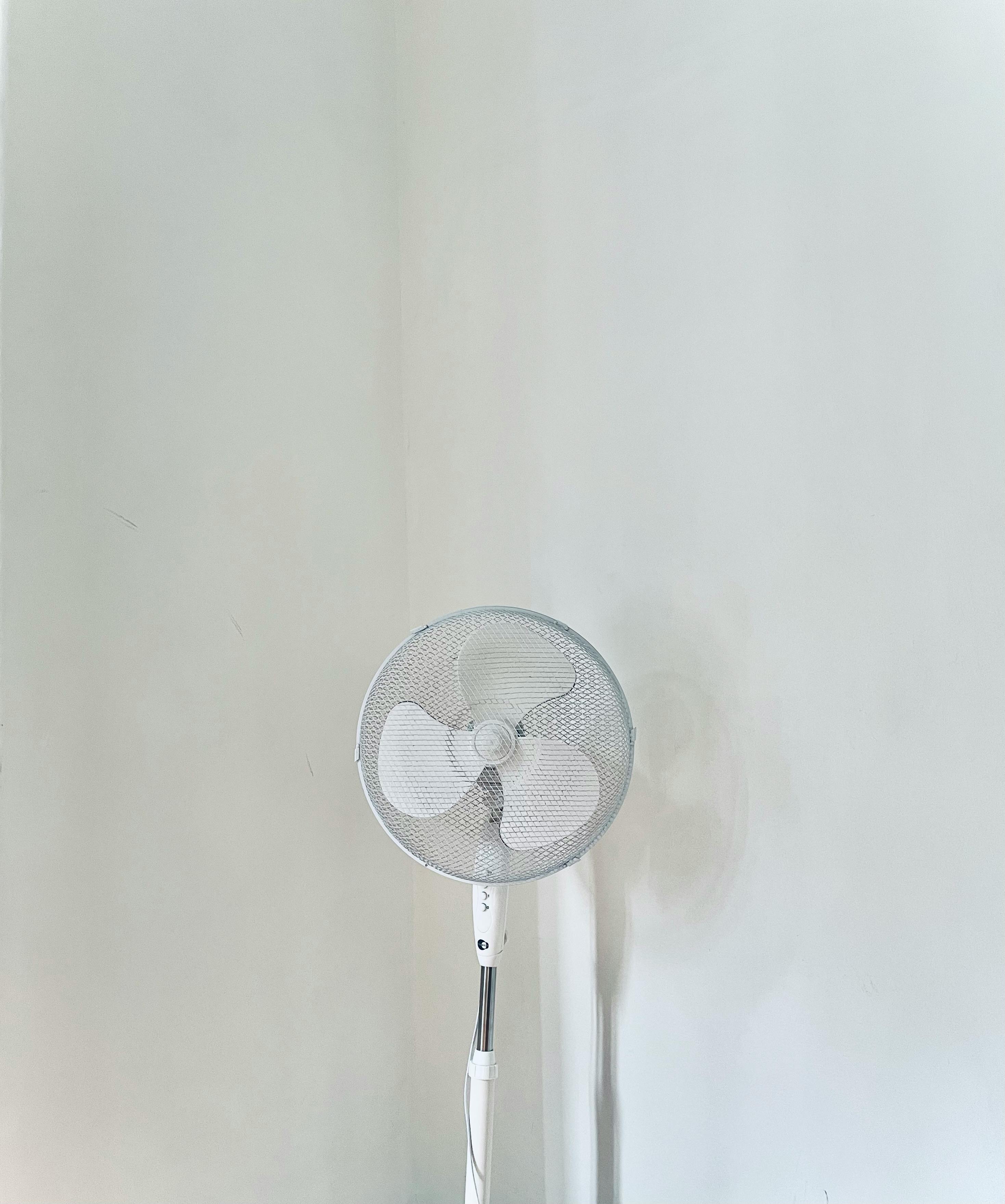 White Desk Fan on White Table · Free Stock Photo