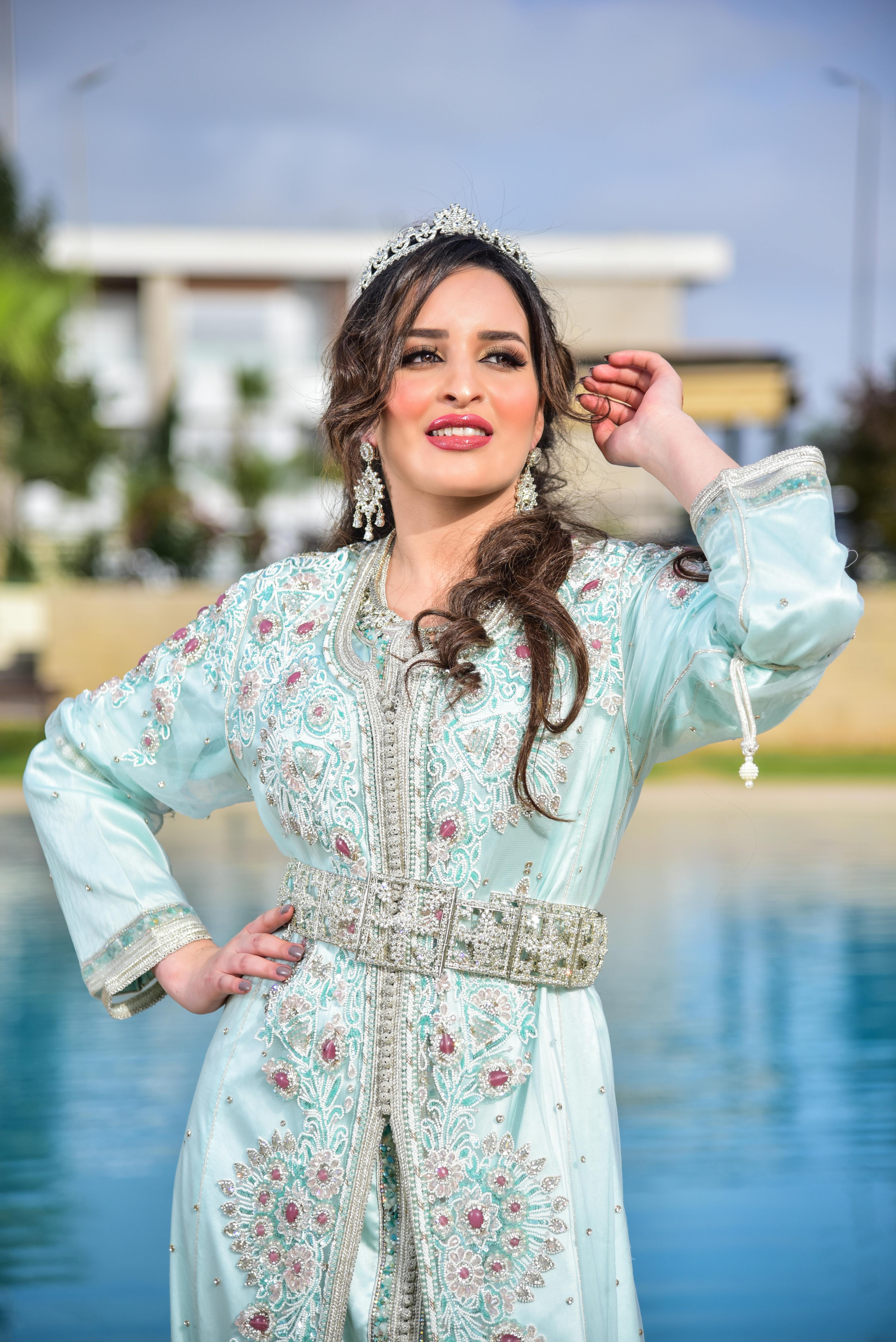 Beautiful Woman Wearing a Crown · Free Stock Photo