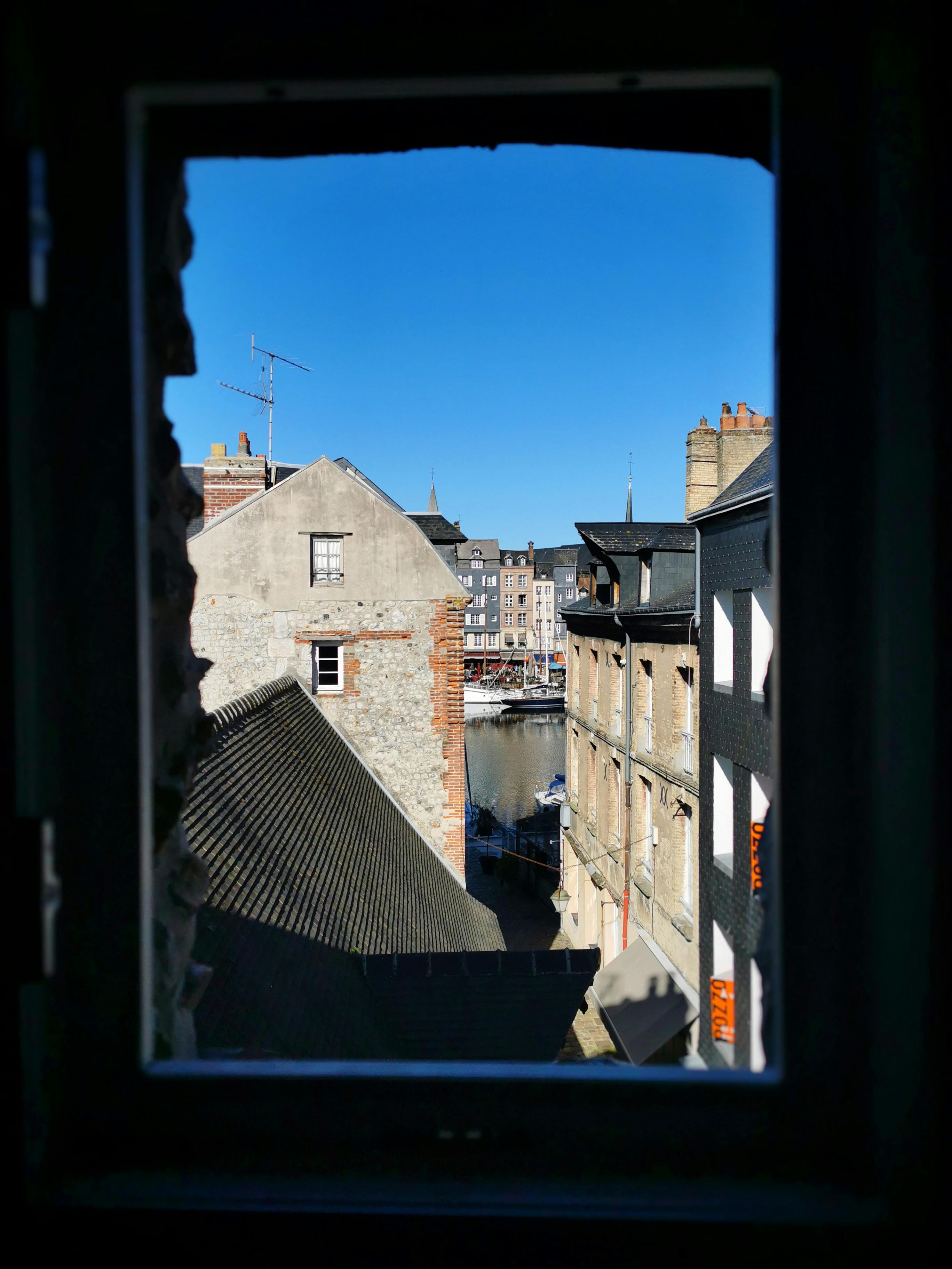 River in Between Buildings · Free Stock Photo