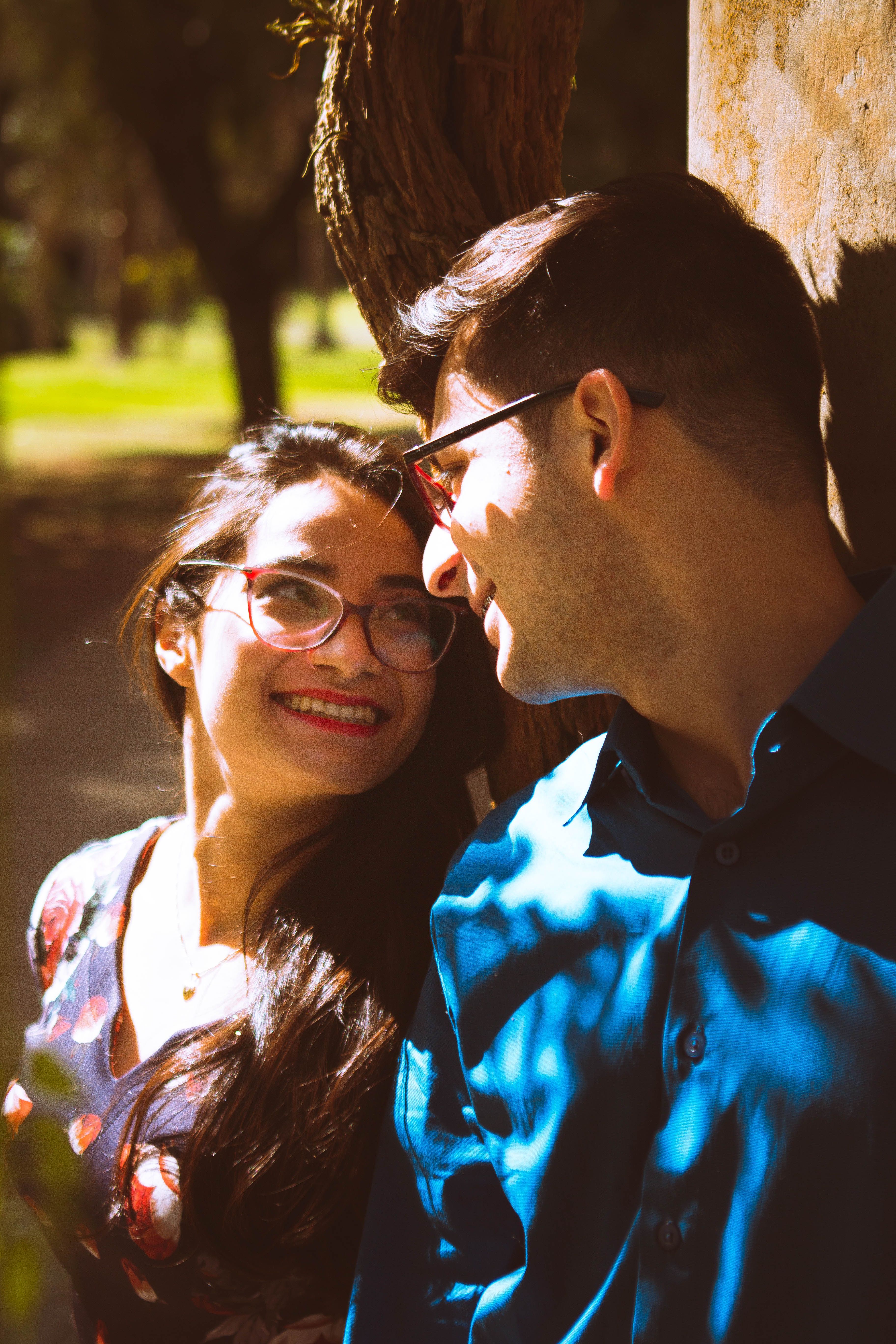 Man and Woman Standing Smiling Face to Face Together Close-Up Photo ...