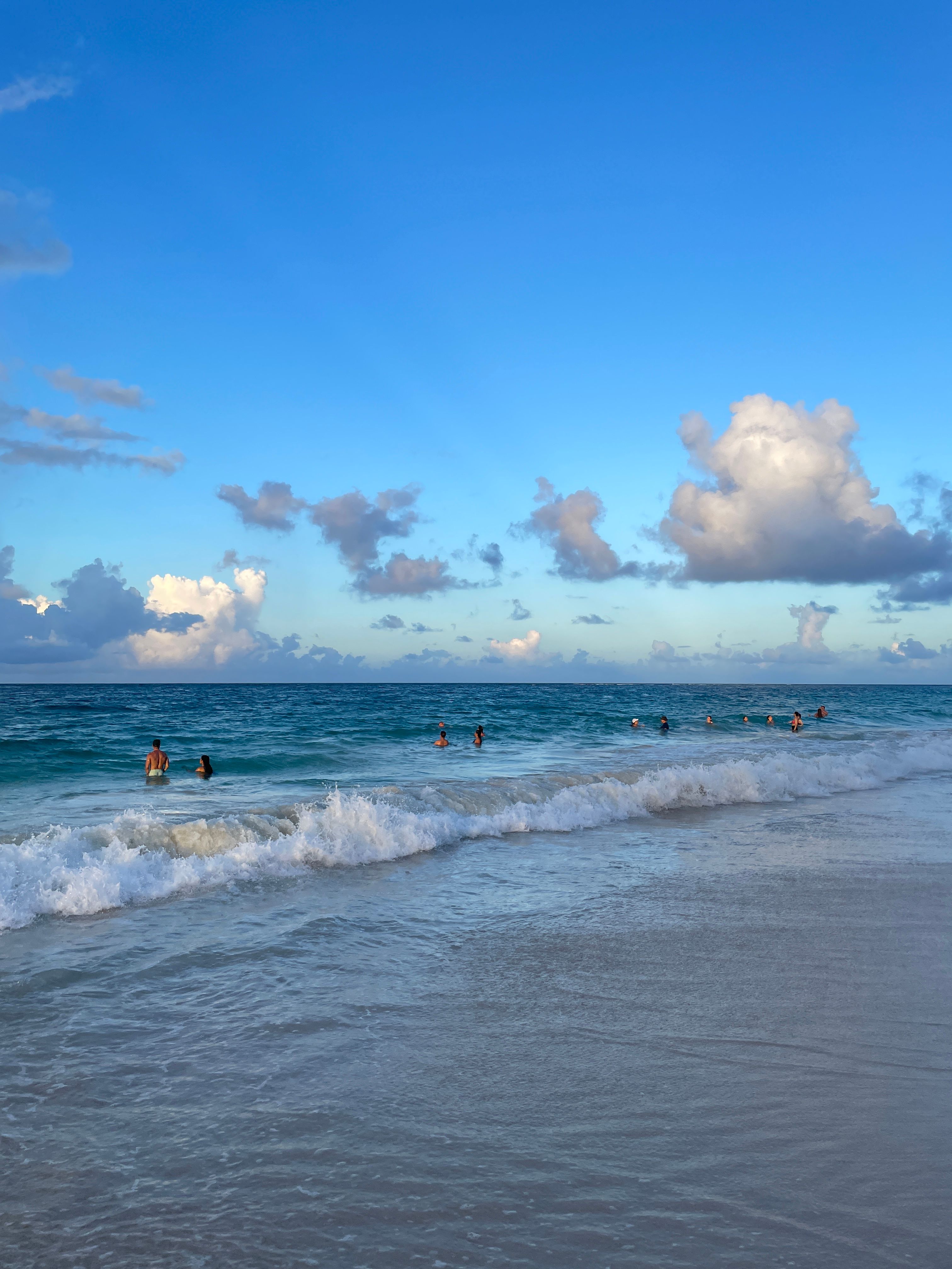 People Swimming on the Beach · Free Stock Photo