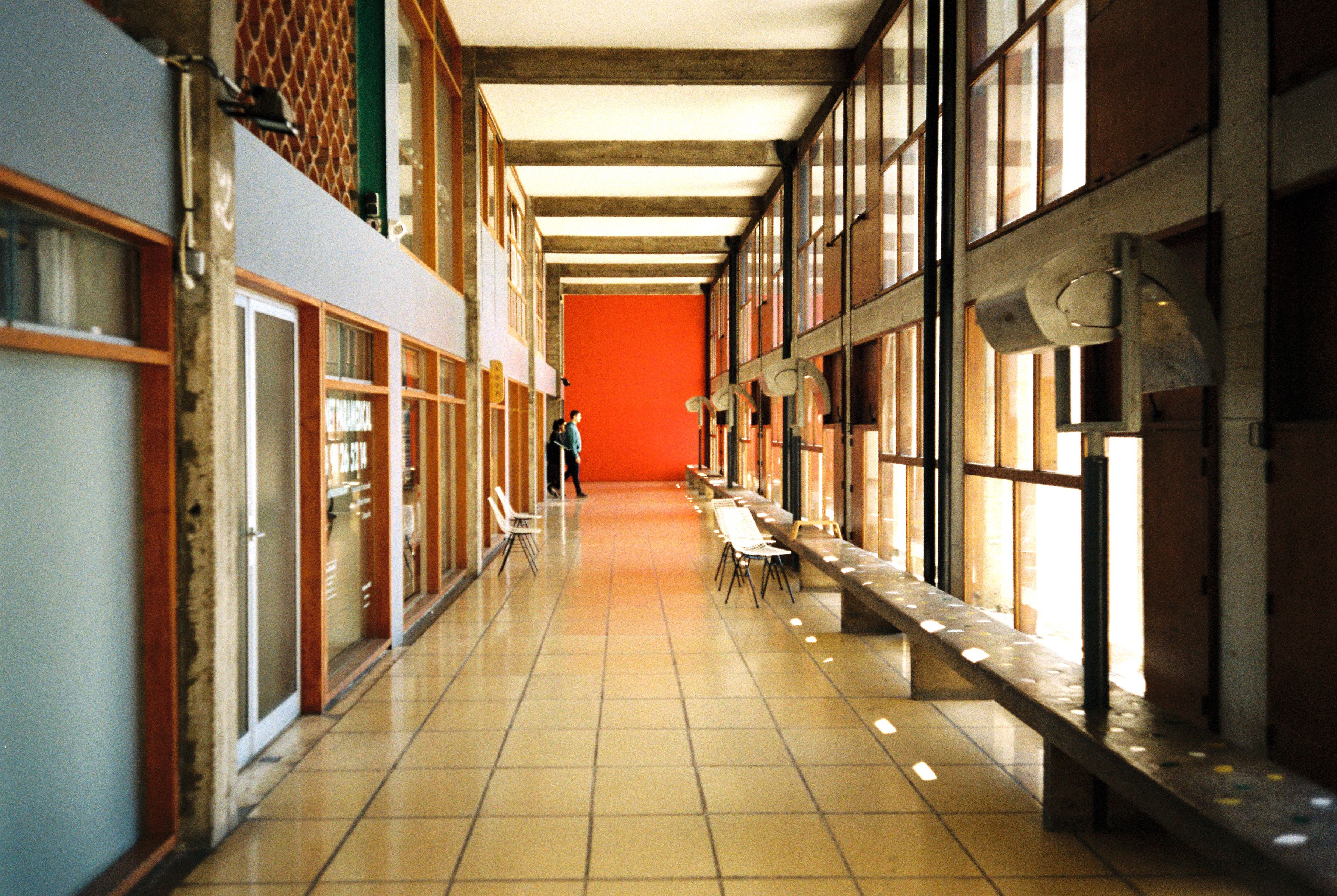 People Walking in the Hallway · Free Stock Photo