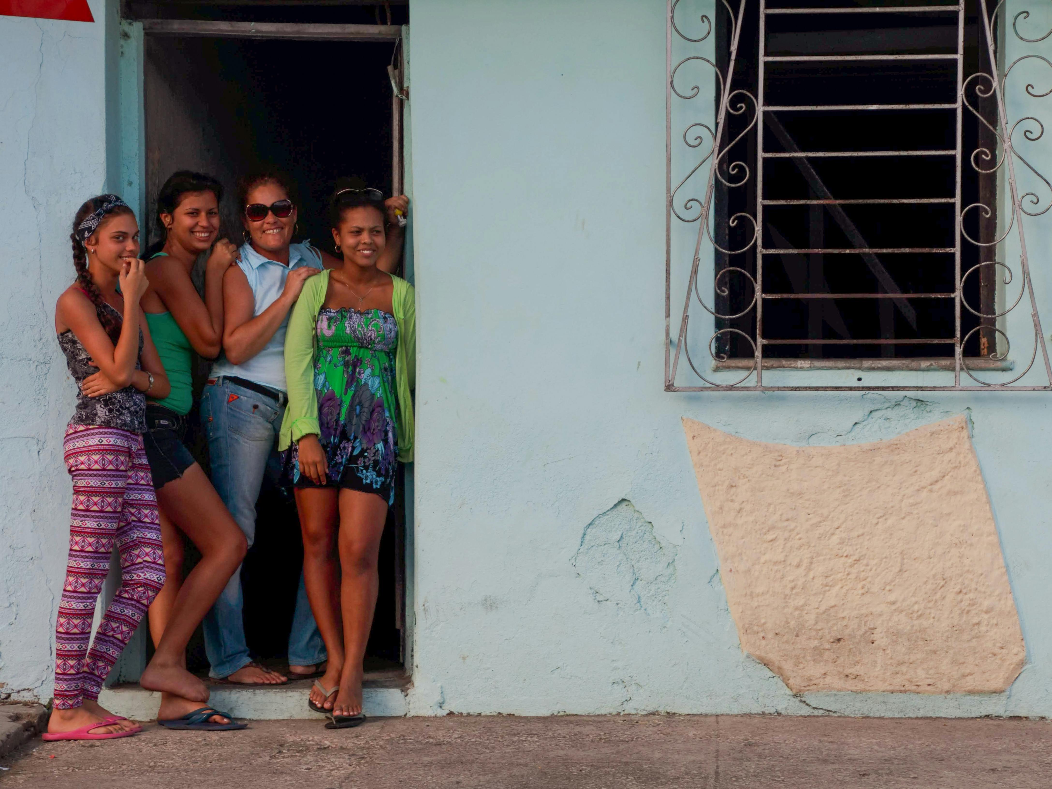 Man Observing Woman Through Doorway · Free Stock Photo