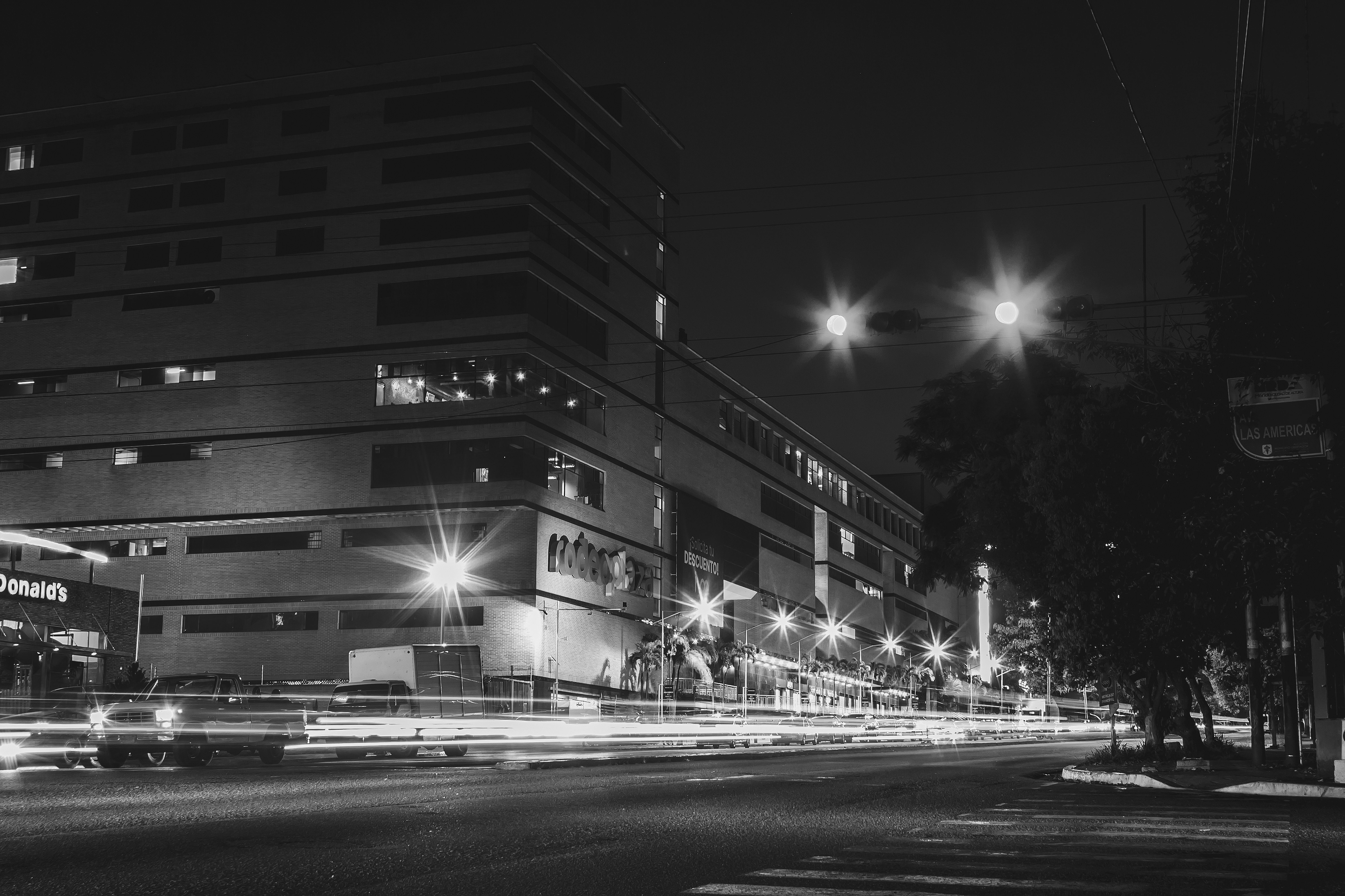 Grayscale Photo of City Street during Nighttime · Free Stock Photo