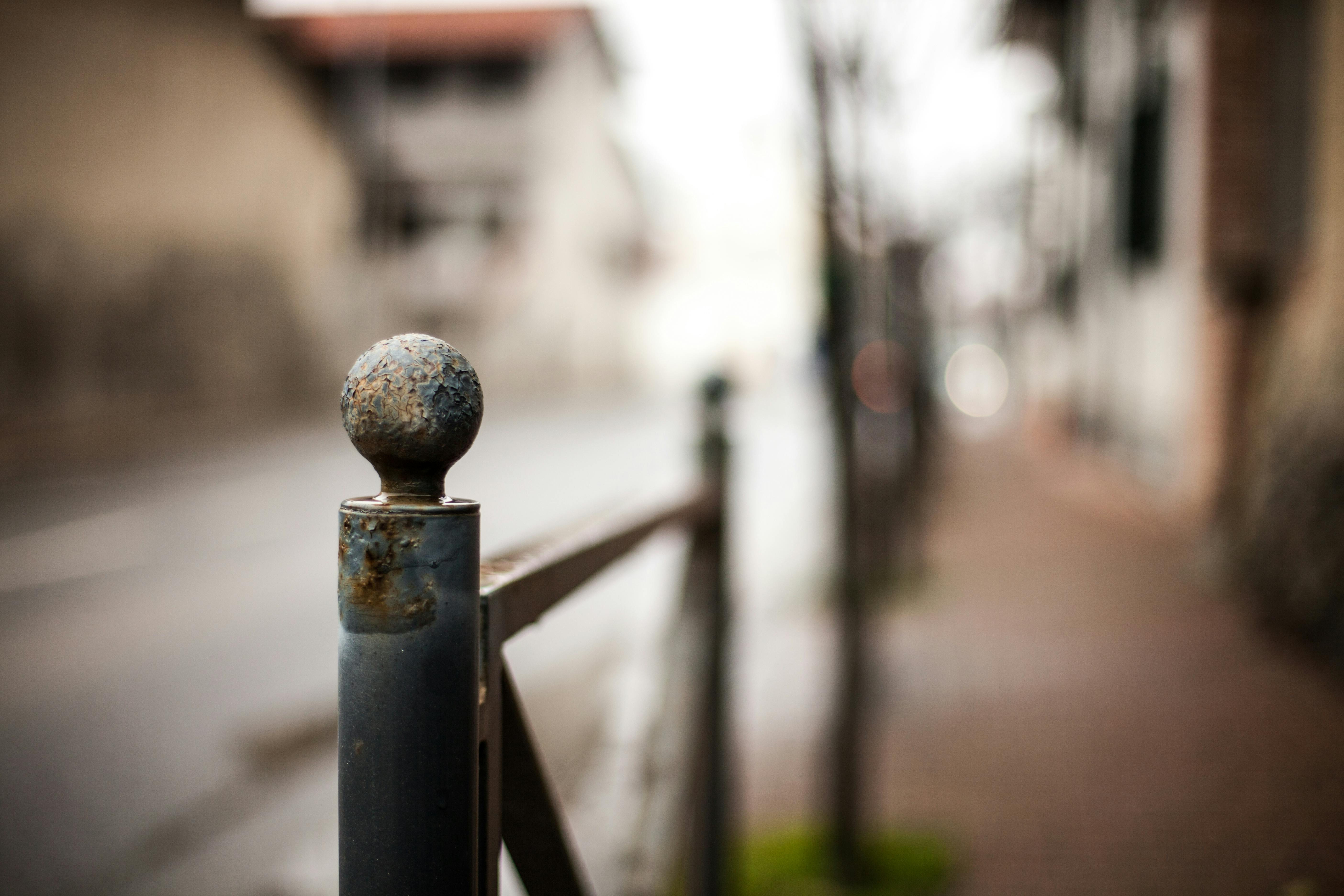 Selective Focus Photography of Black Metal Rail · Free Stock Photo