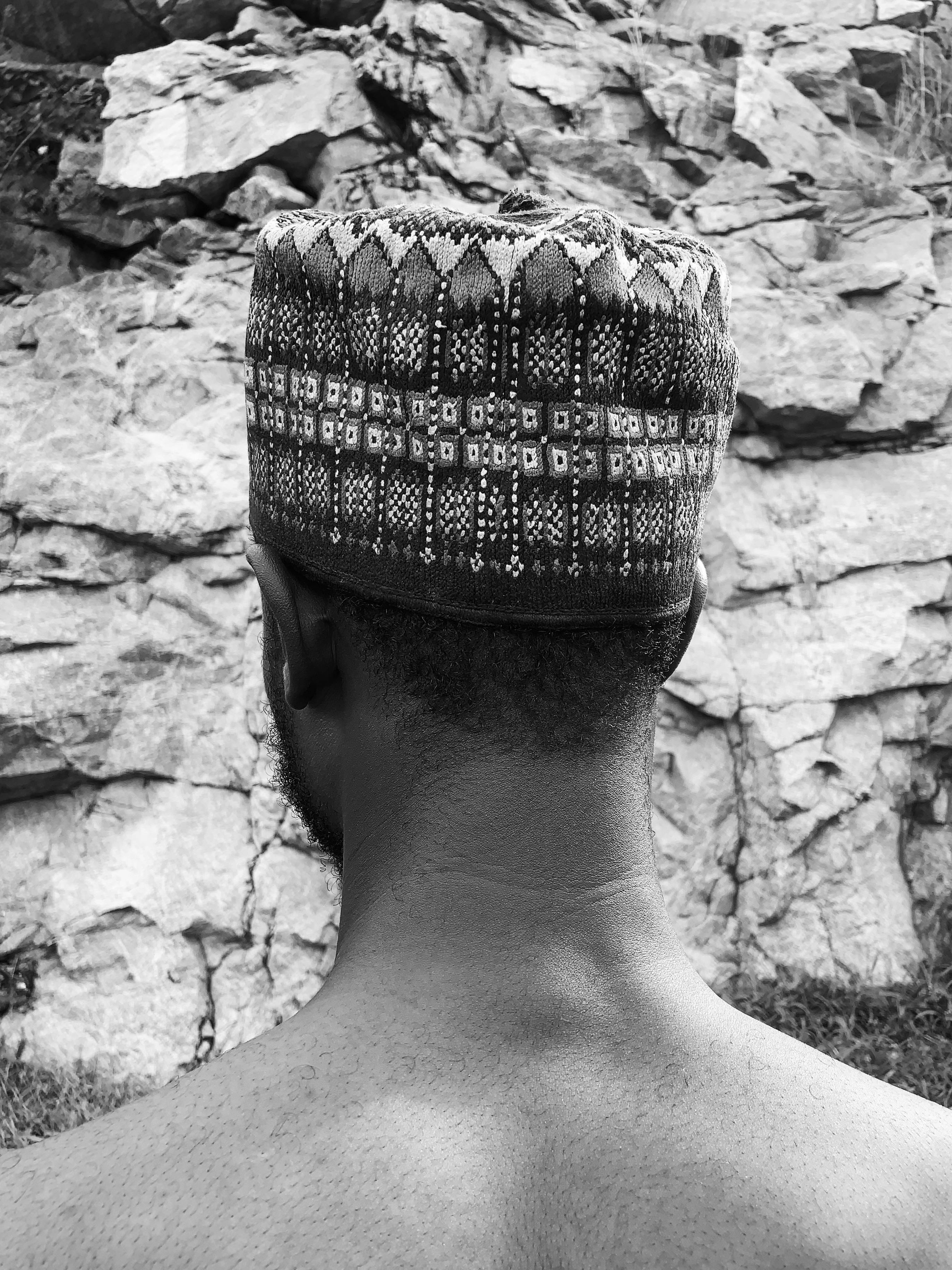 Back View of Man in Traditional Hat · Free Stock Photo