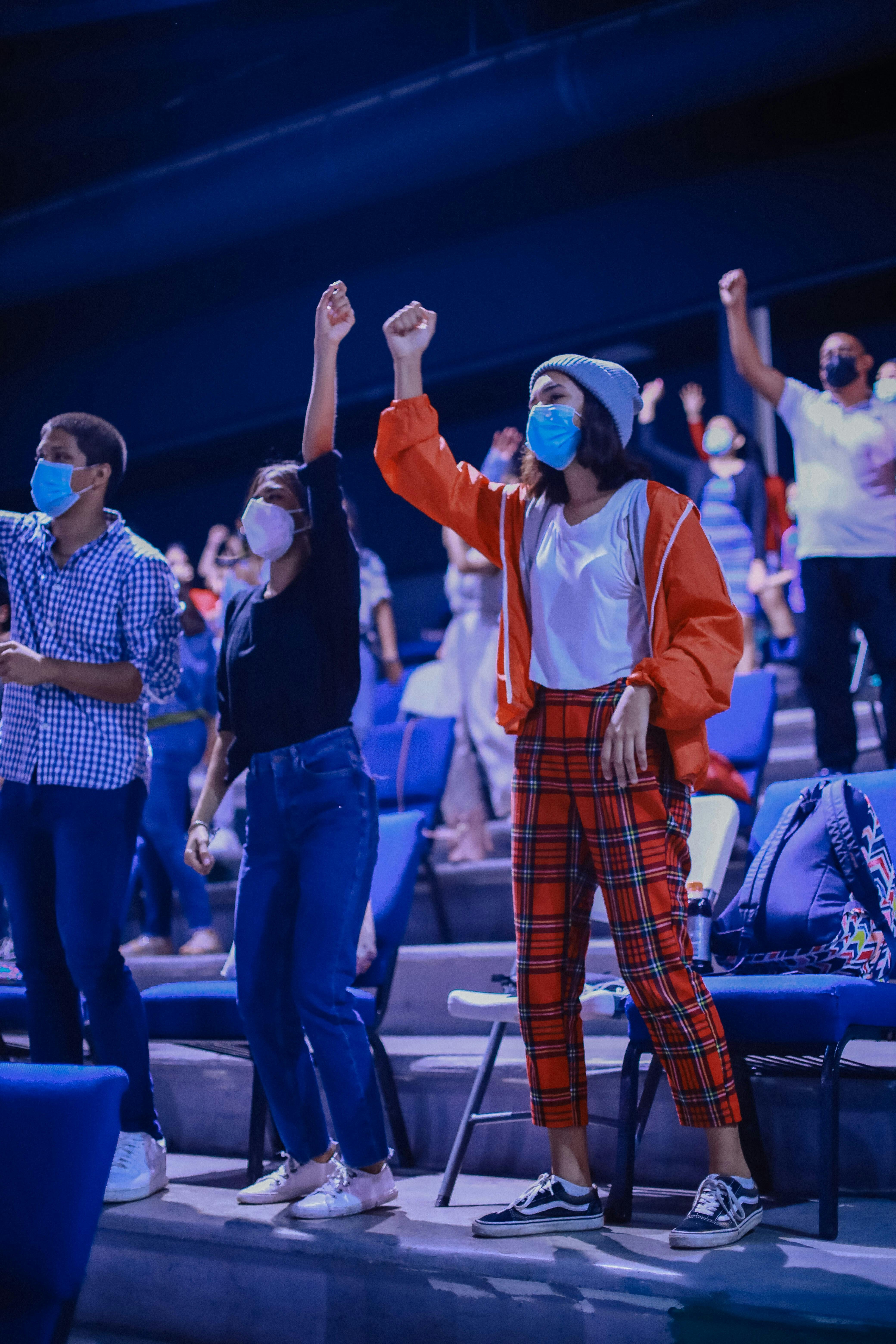 People Raising their Hands · Free Stock Photo