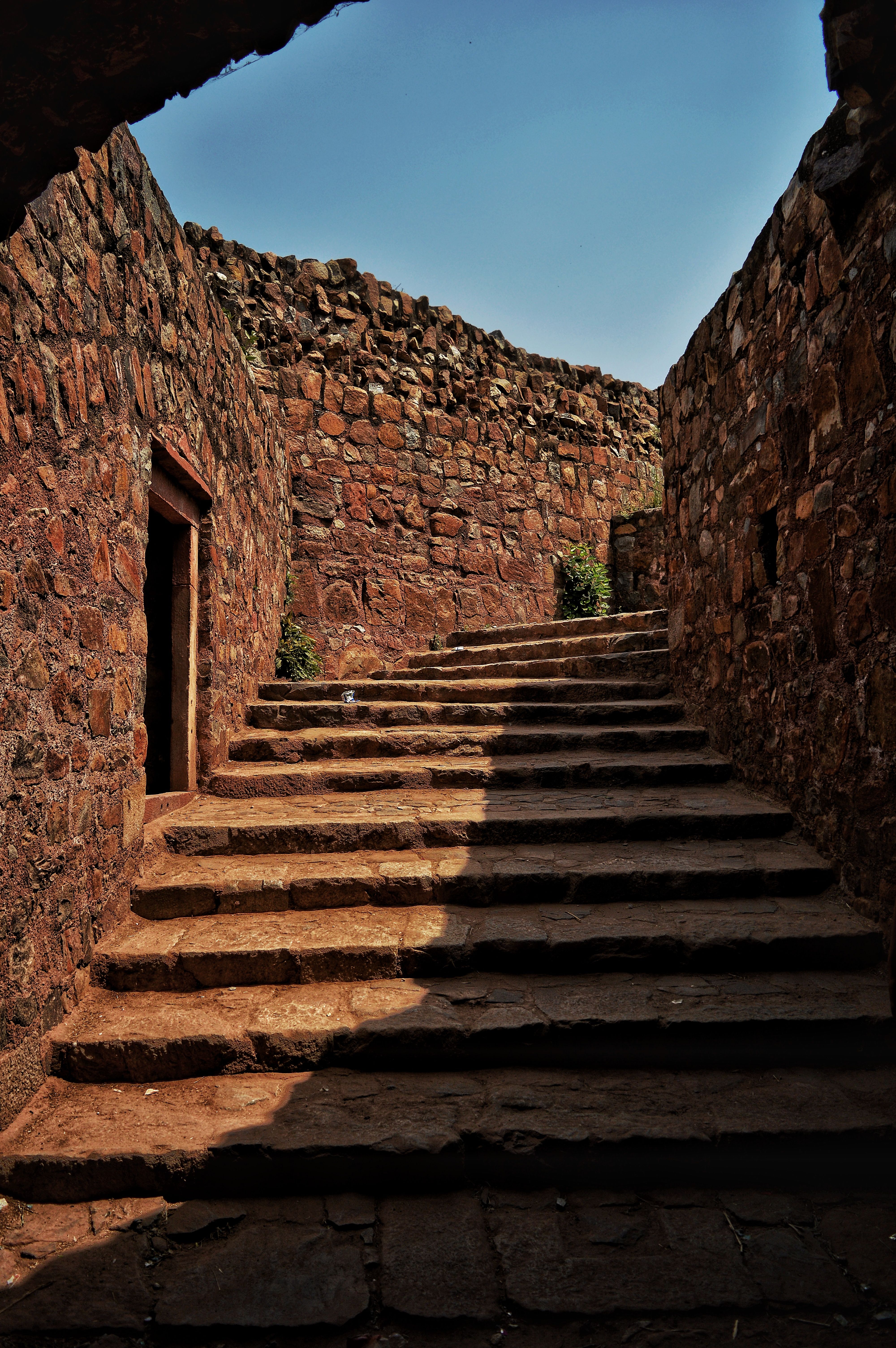 Steps between Stone Walls of a Fortification · Free Stock Photo