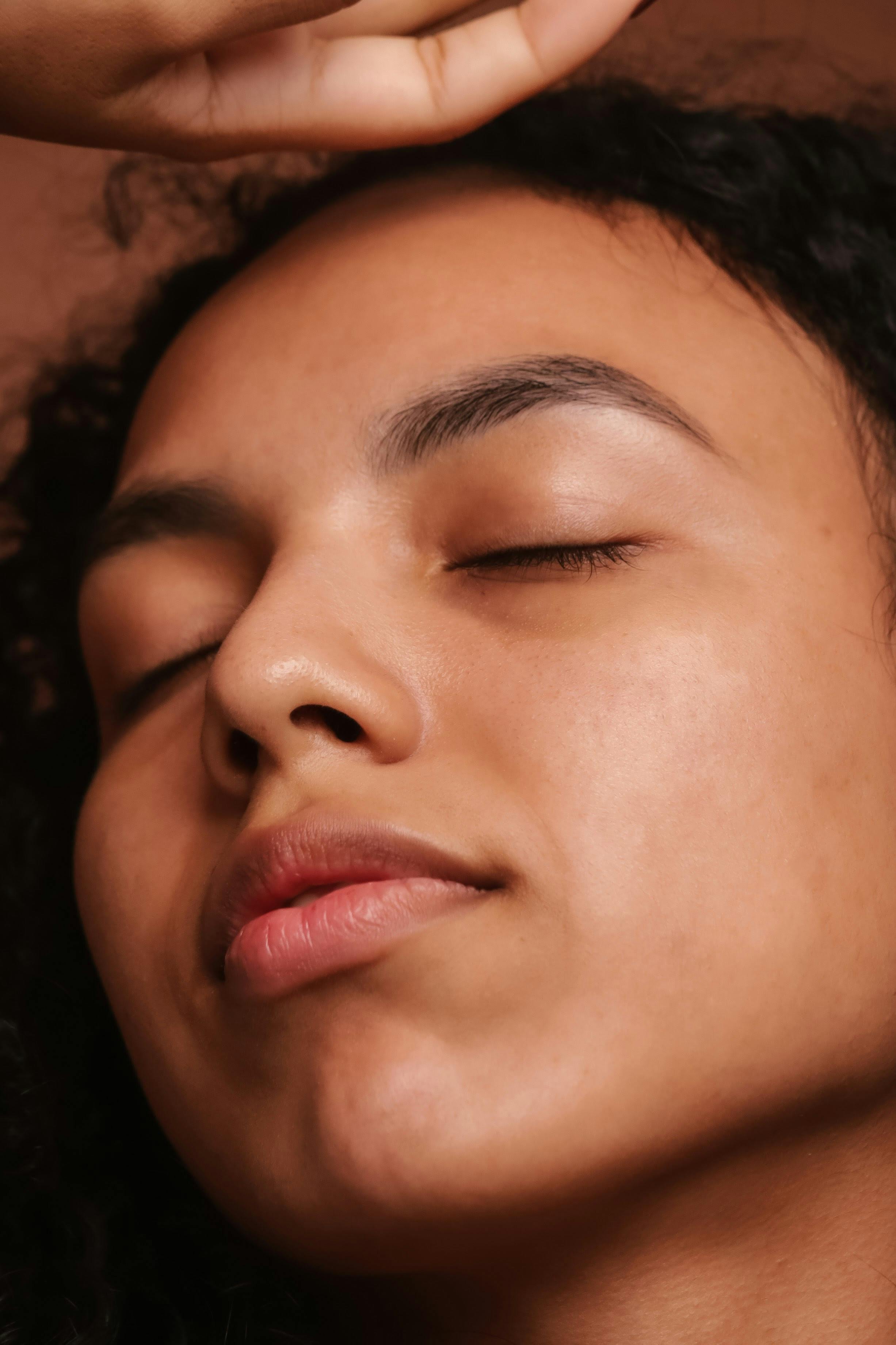 Close-up of Two Young Women Standing Cheek to Cheek · Free Stock Photo