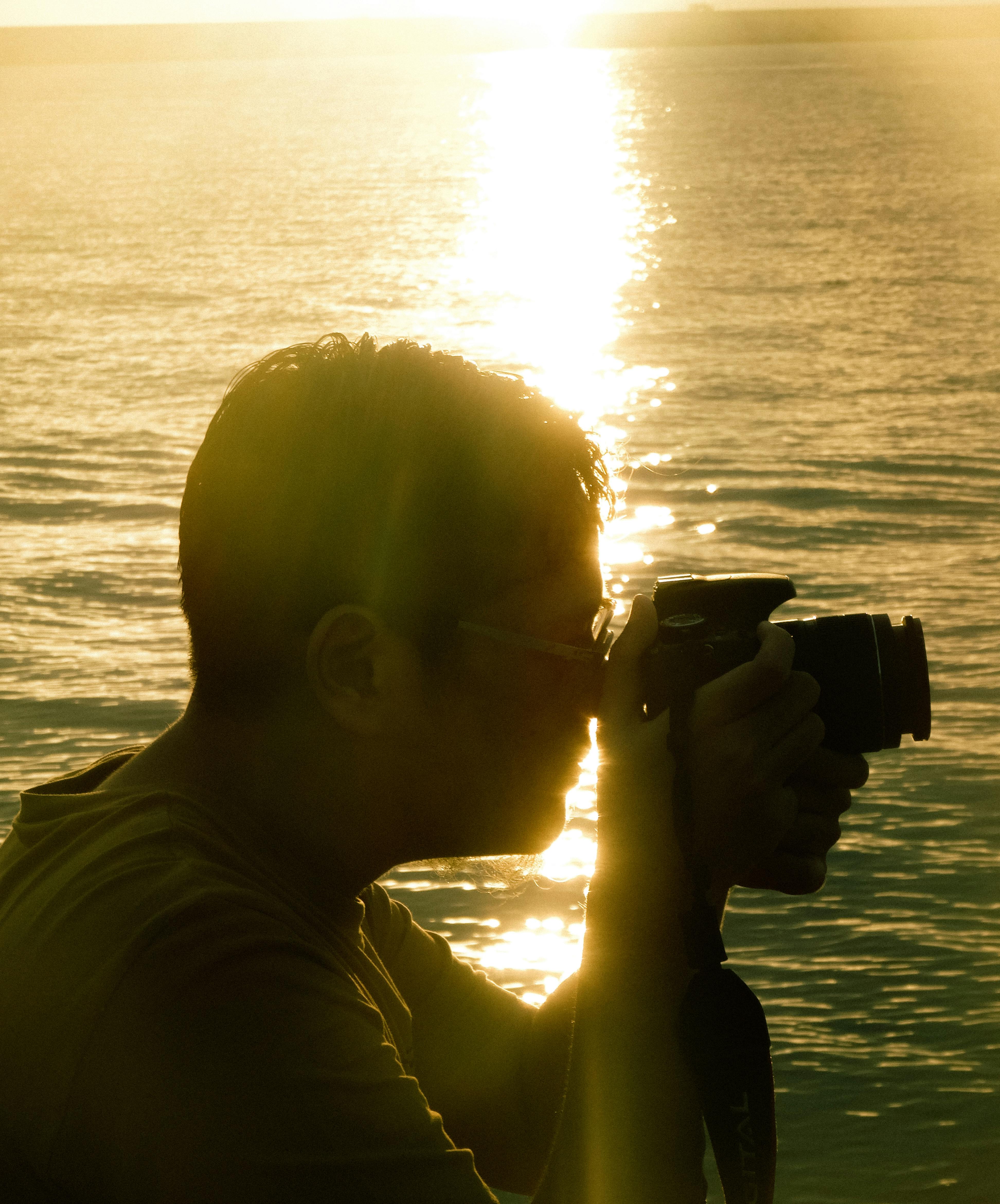 Photo of a Man taking Picture · Free Stock Photo