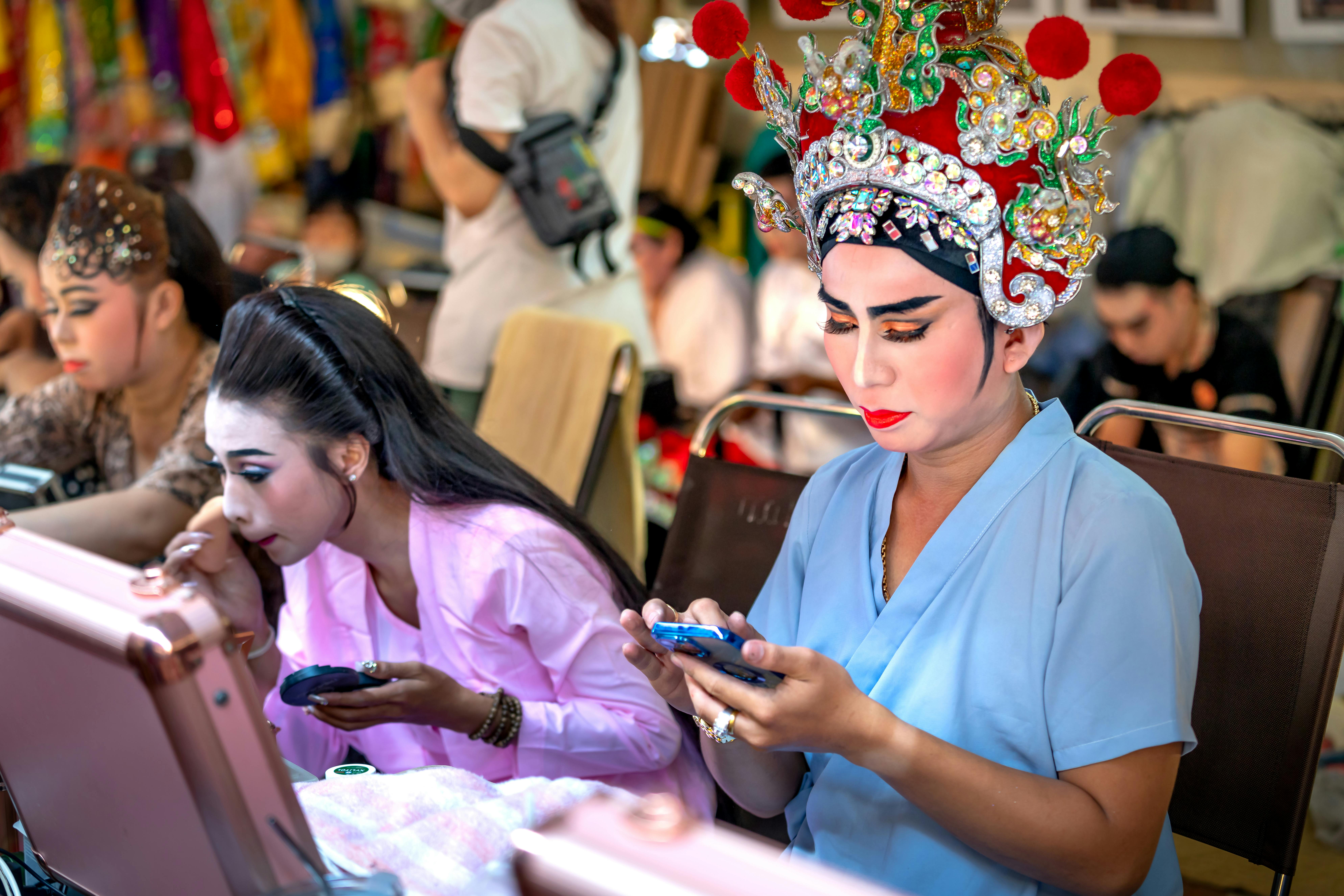 Women Preparing, Wearing Traditional Clothing and Makeup · Free Stock Photo