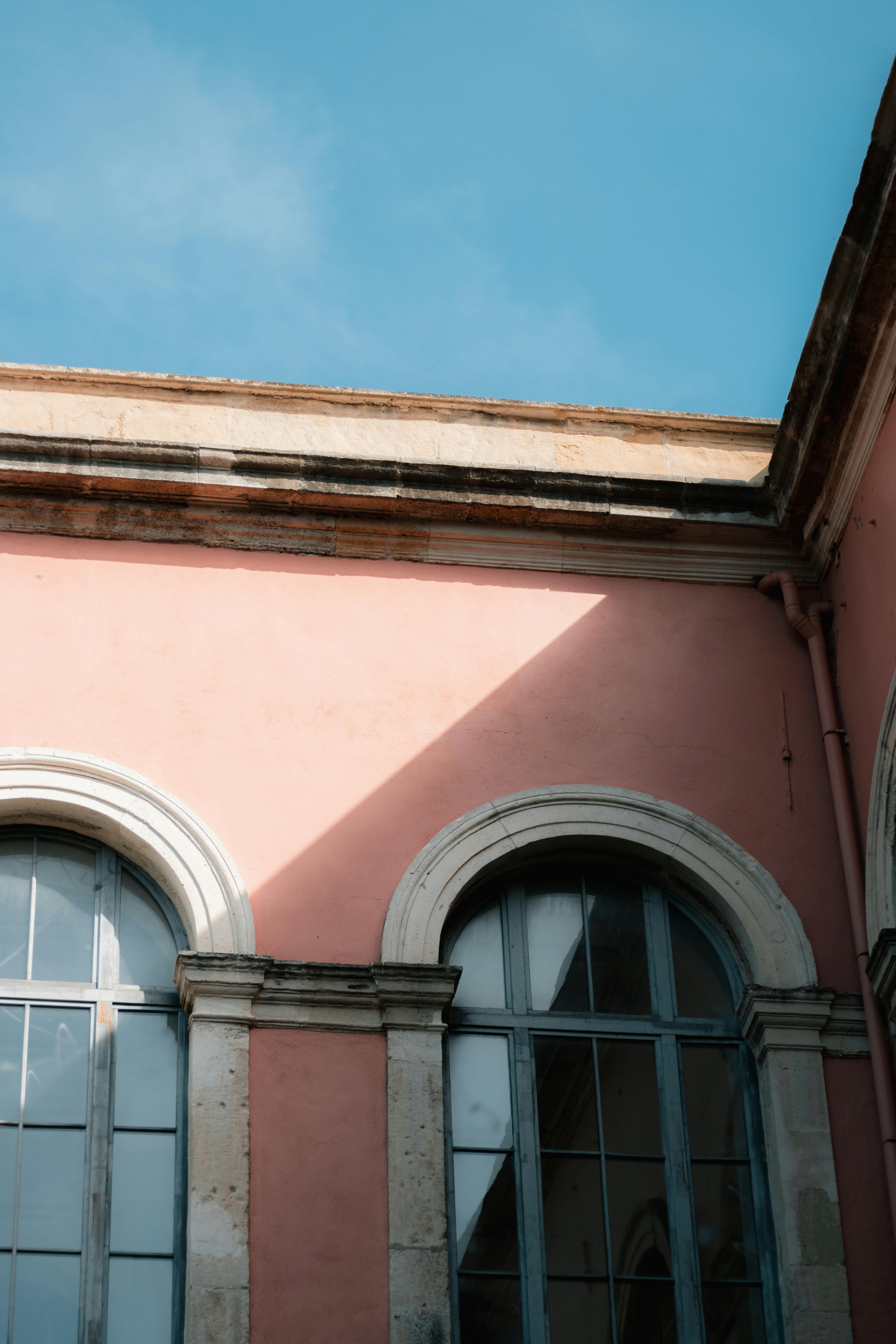 Windows on Building Facade · Free Stock Photo