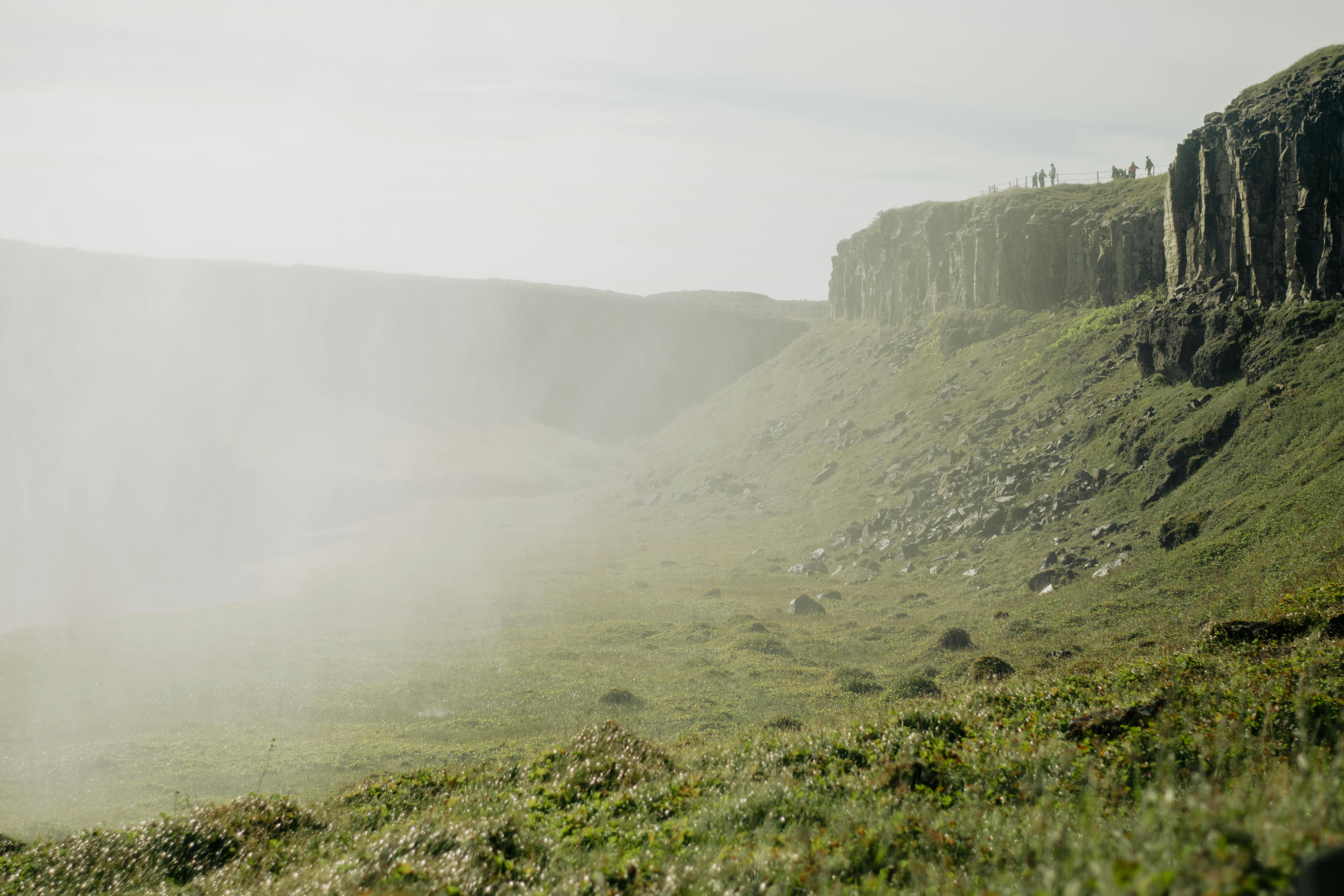Cliff and Pasture Covered by Fog · Free Stock Photo