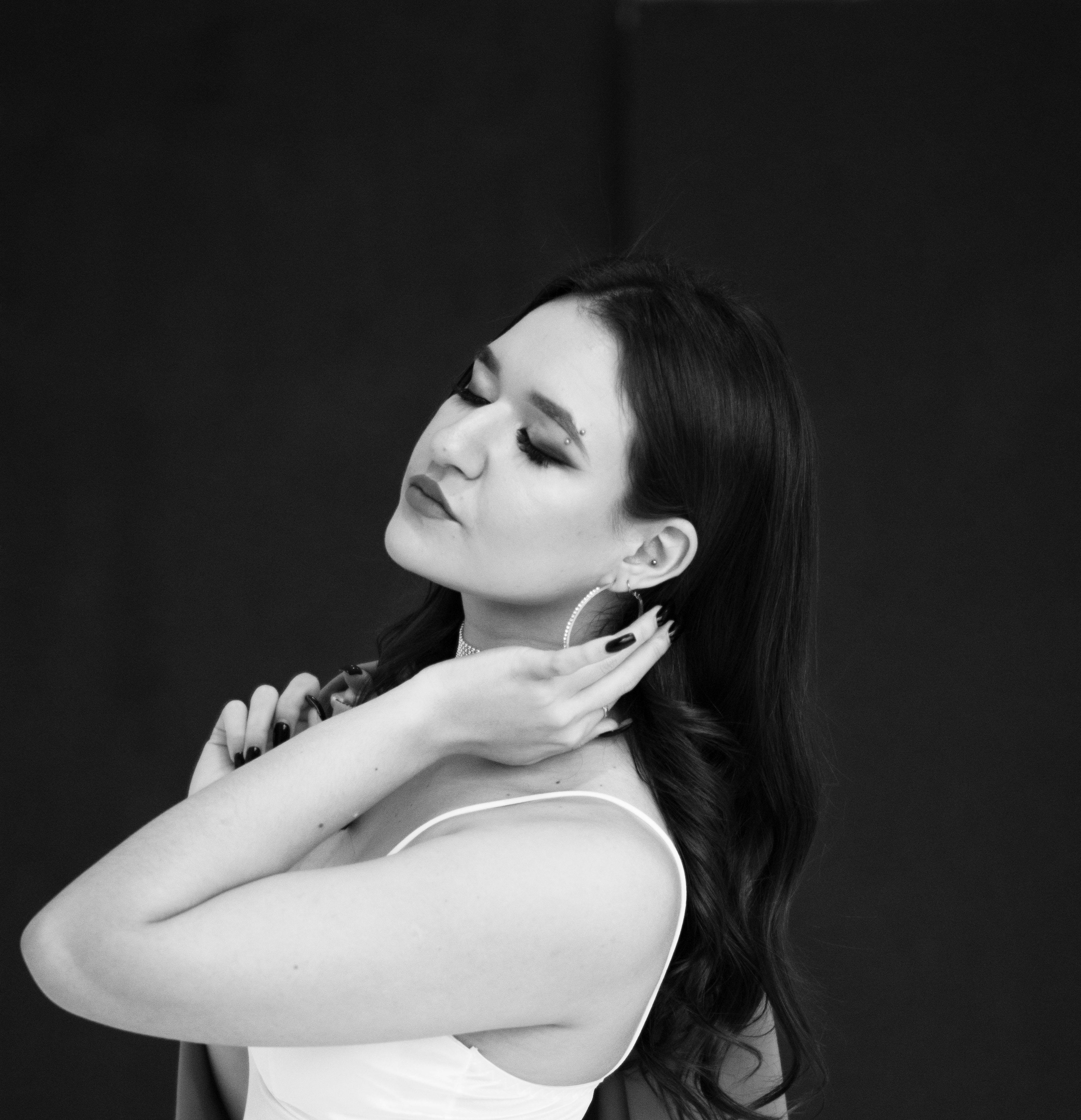 A Woman Wearing Earring · Free Stock Photo