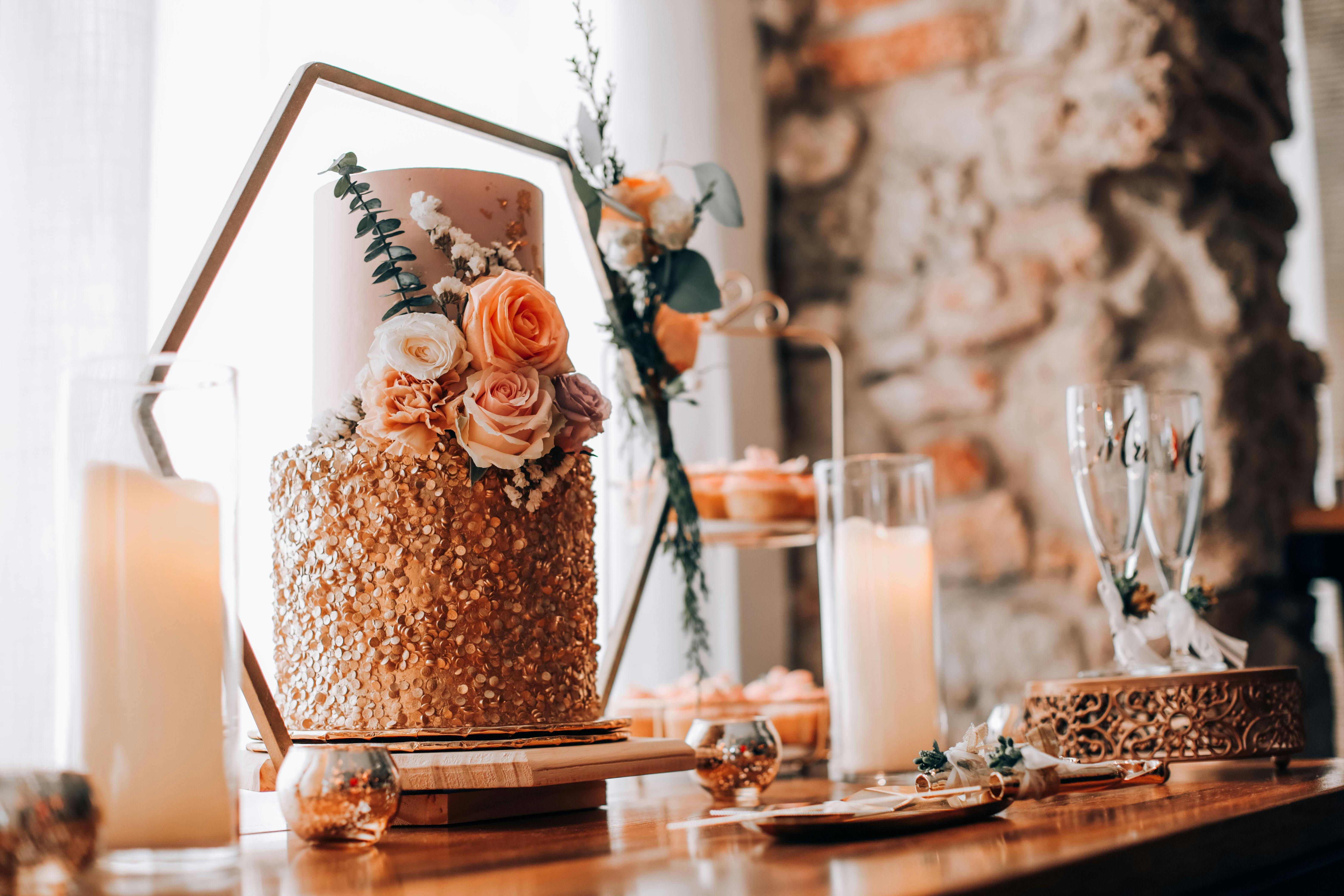 A Cake on the Table With Champagne Glass · Free Stock Photo