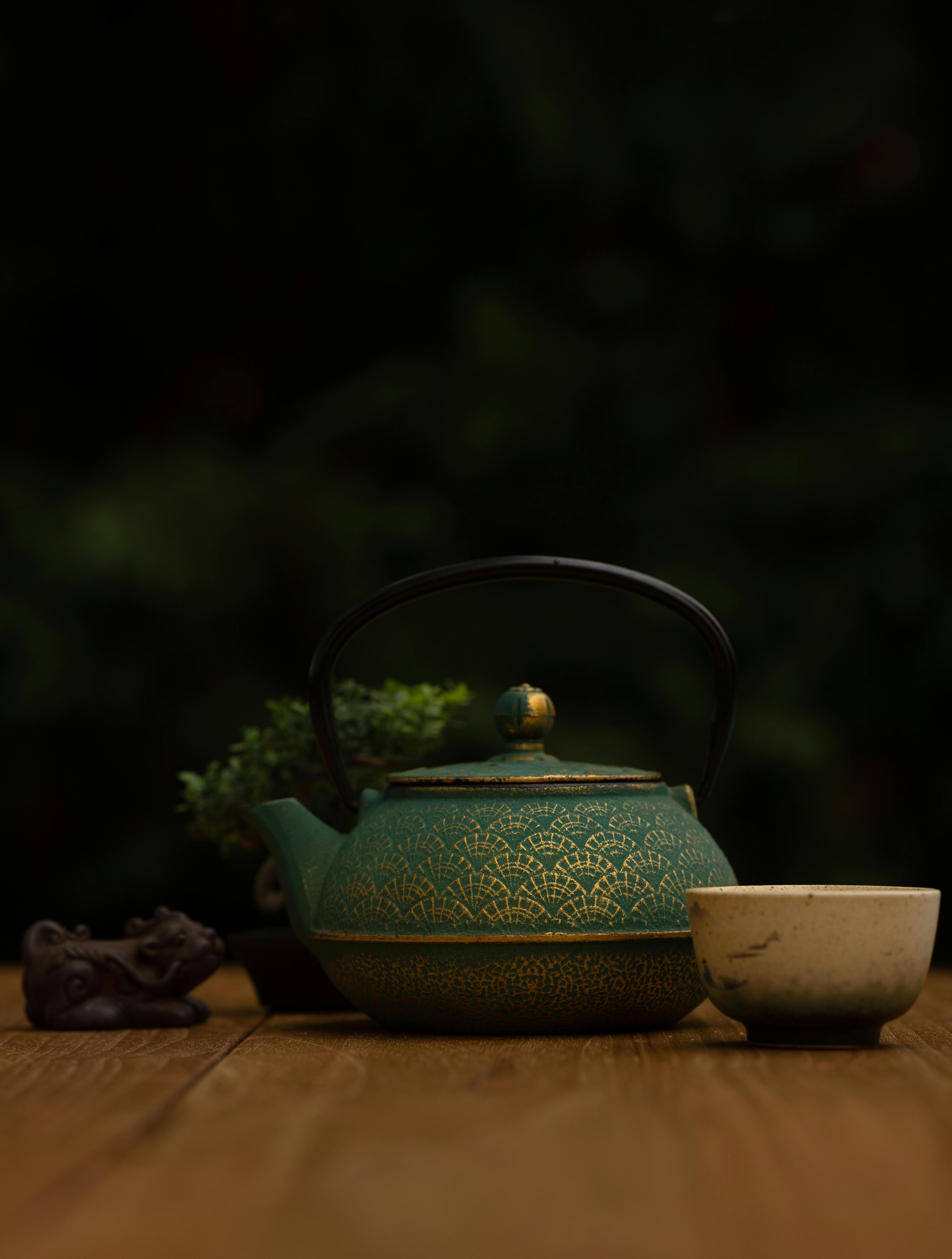 Old-fashioned Teapot on Wooden Table · Free Stock Photo