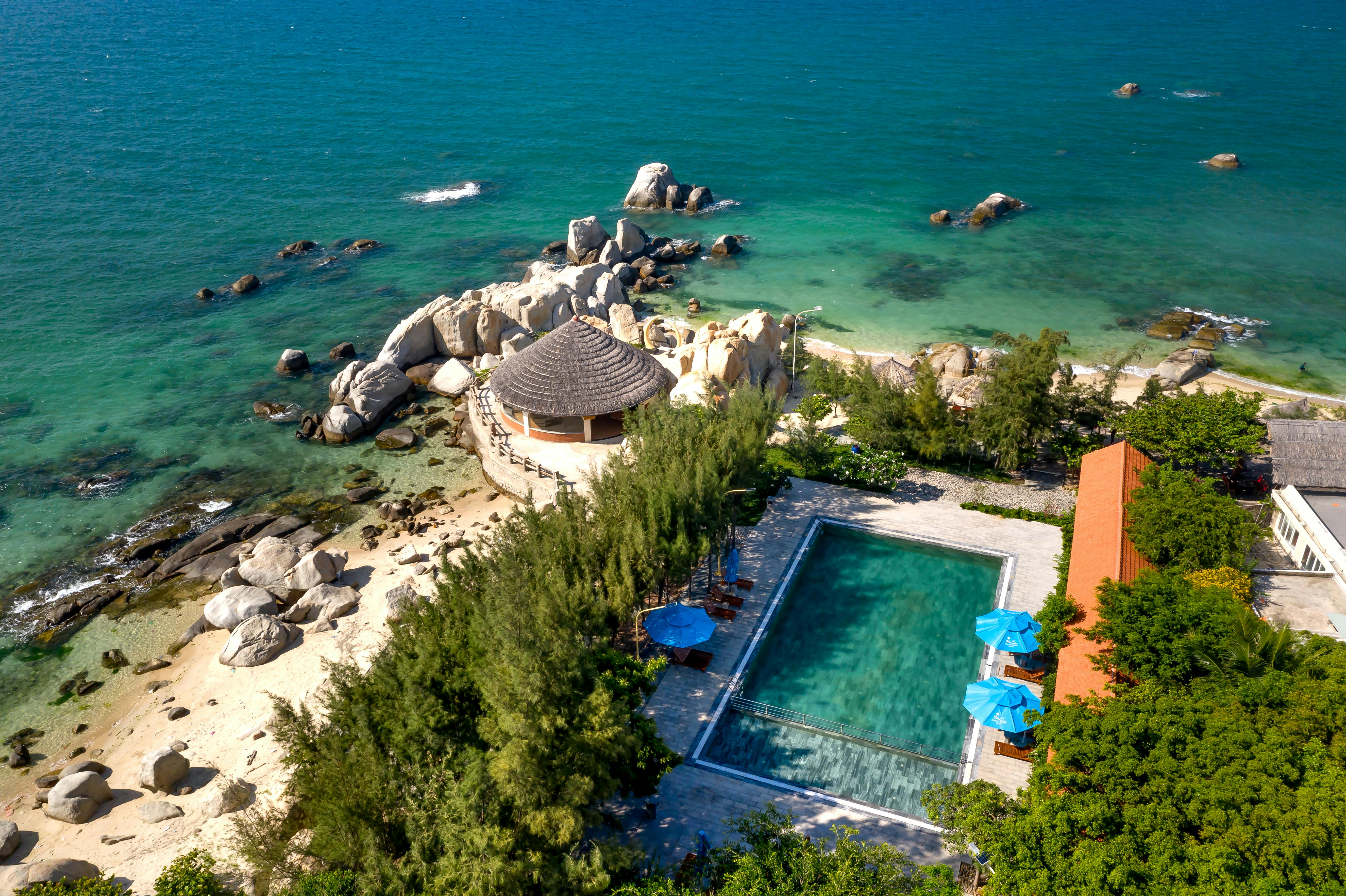 Aerial View of Swimming Pool Sea and Coastline · Free Stock Photo