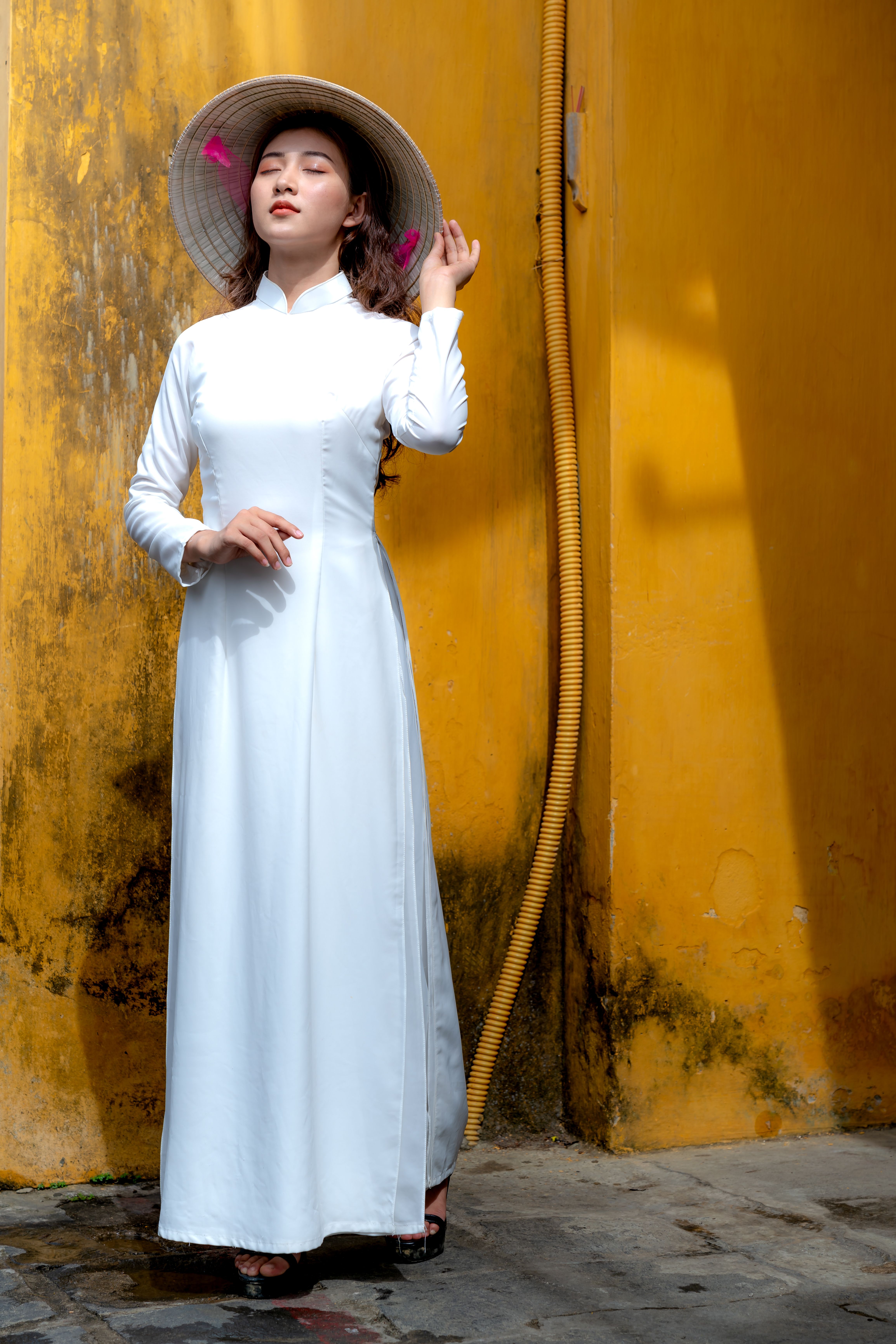 Woman in White Traditional Dress Wearing Conical Hat · Free Stock Photo